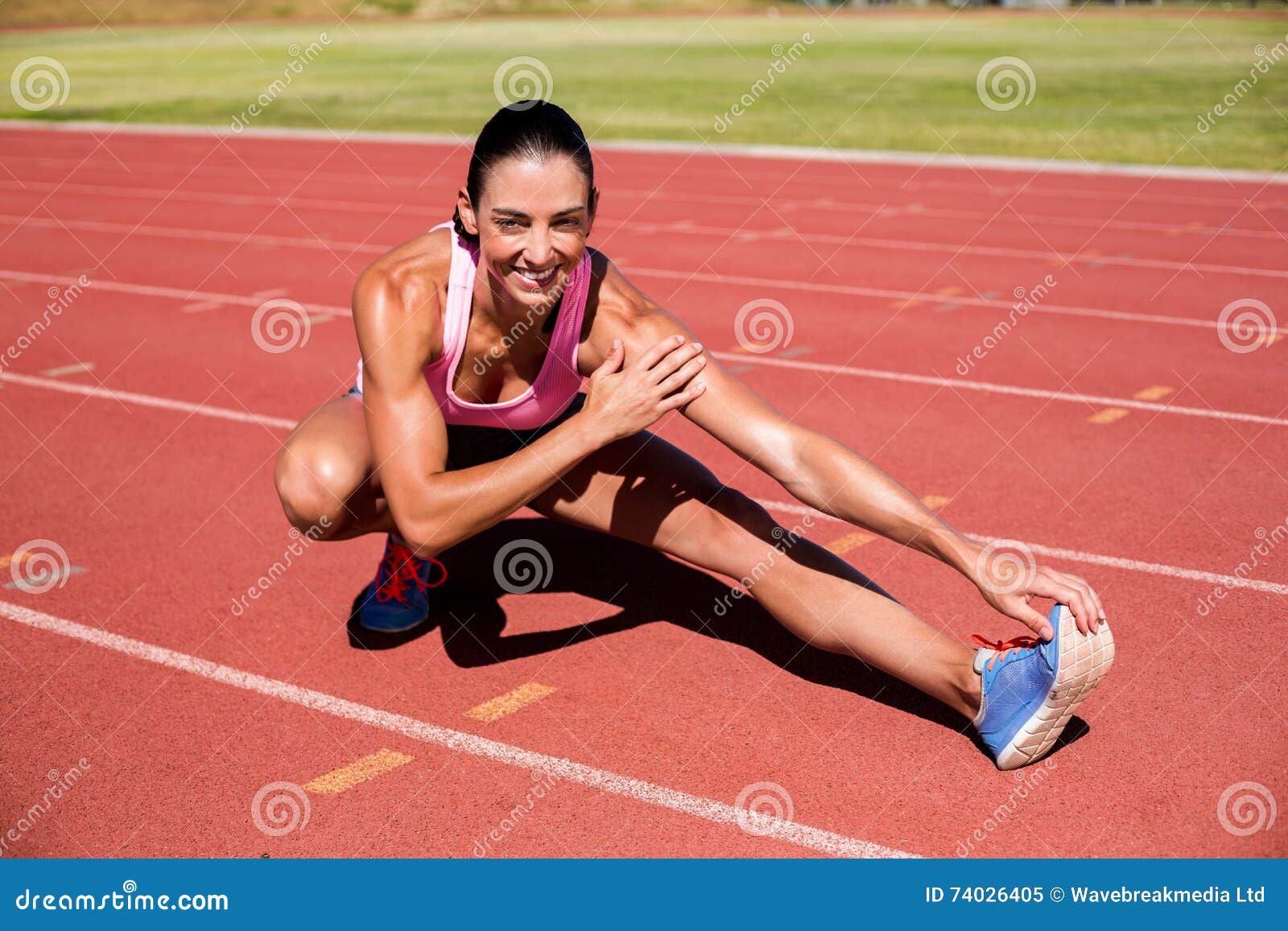 Portrait of Female Athlete Stretching Her Hamstring Stock Image - Image ...