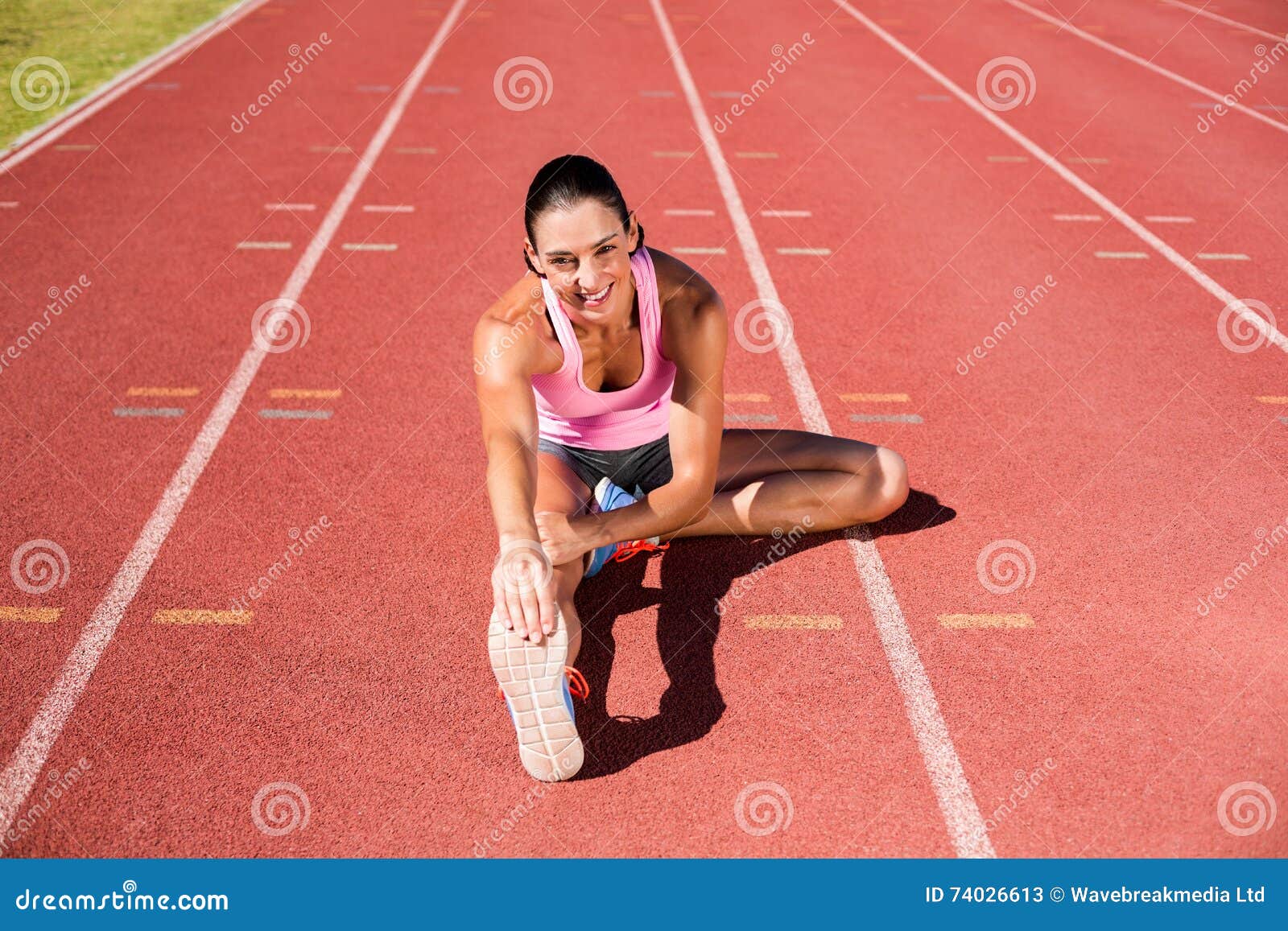 Portrait of Female Athlete Stretching Her Hamstring Stock Image - Image ...
