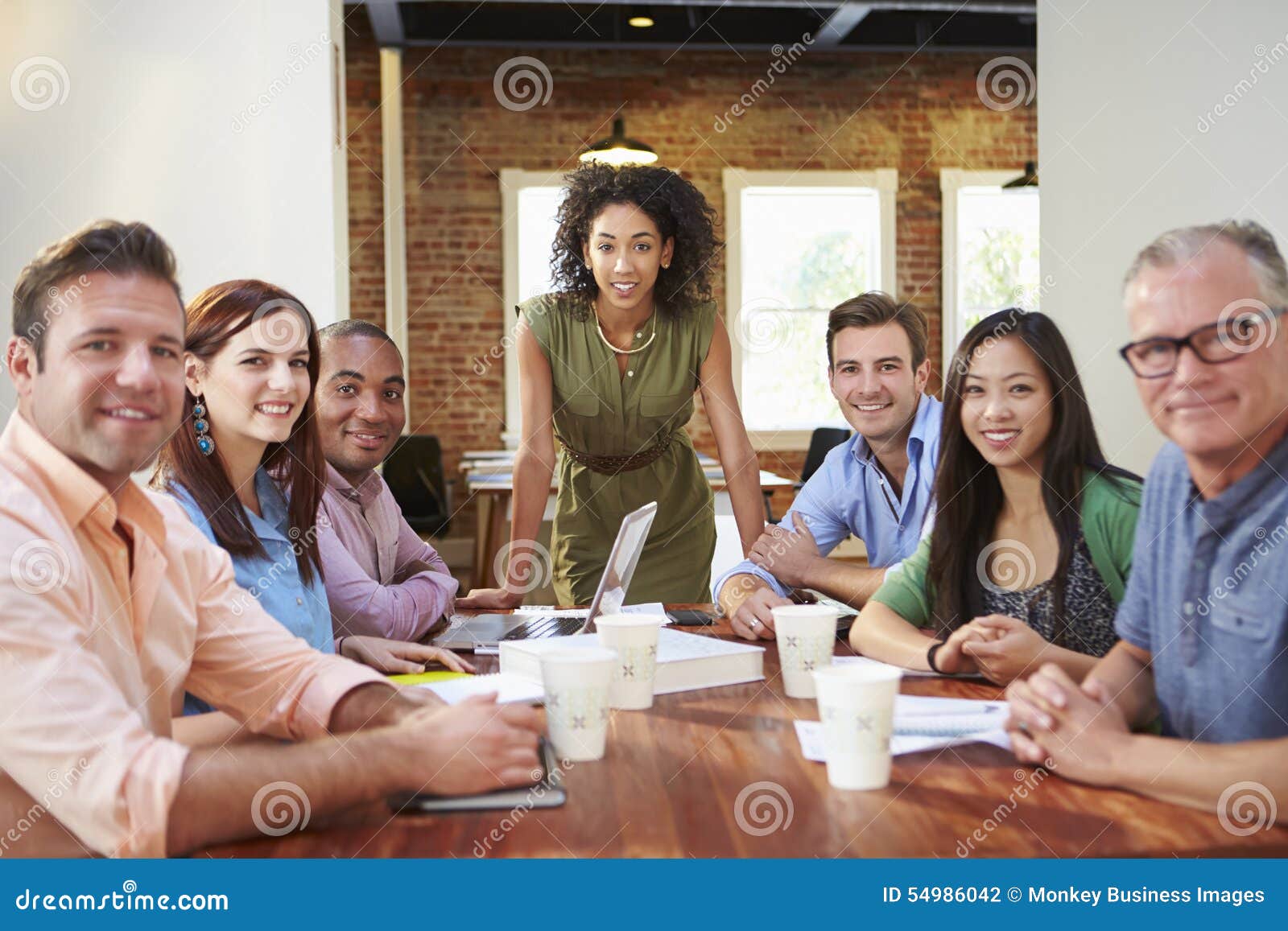 Portrait of Female Boss with Team in Meeting Stock Photo - Image of ...