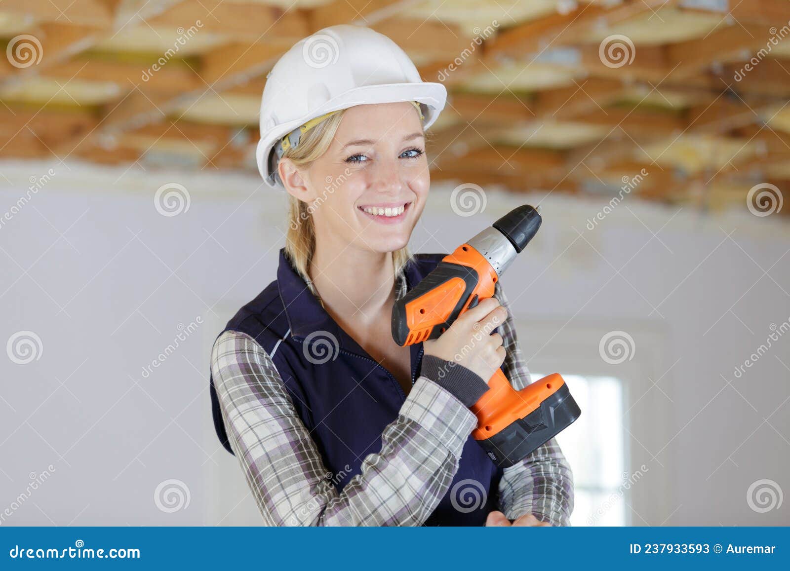 Portrait Female Builder Holding Cordless Drill Stock Image - Image of ...