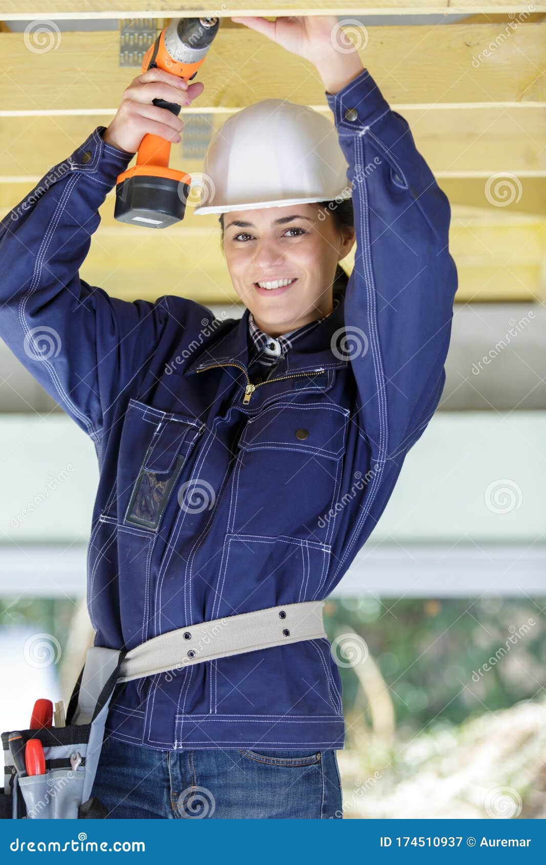 Portrait Female Builder Using Cordless Drill Stock Image - Image of ...