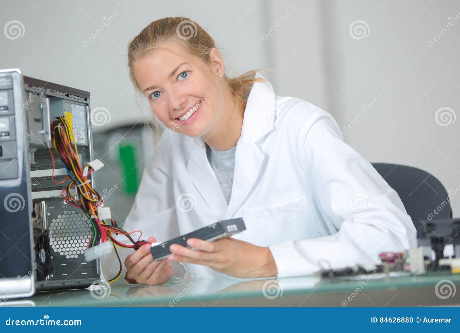 Portrait Female Computer Technician Stock Photo - Image of component ...