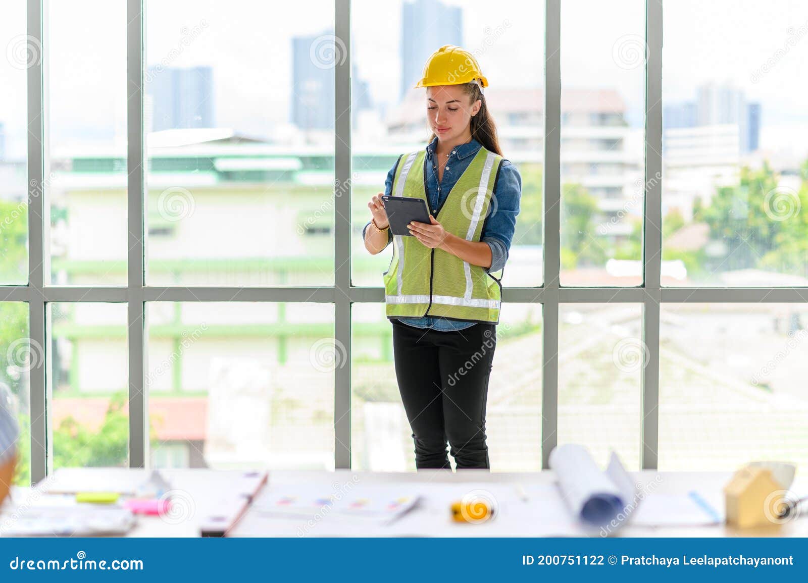 Portrait of Female Construction Engineer Workers in Yellow Hardhat with ...
