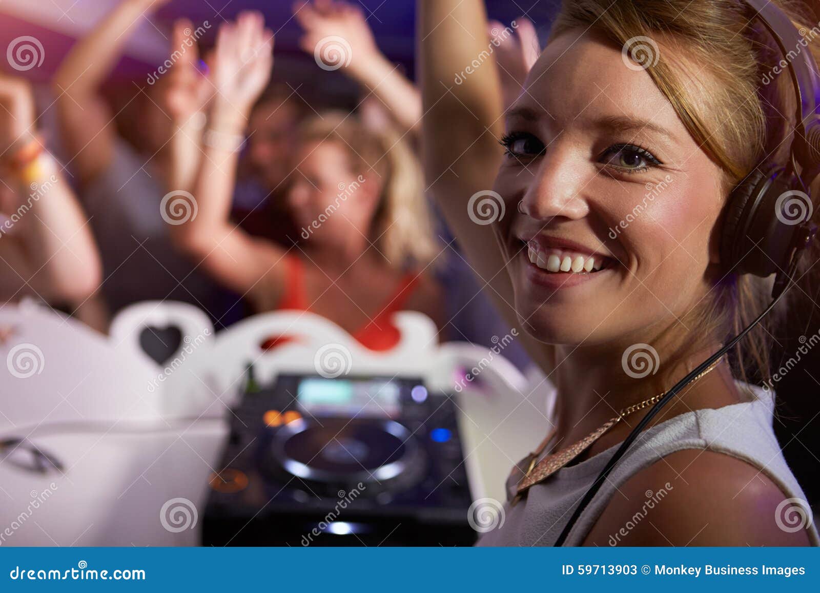 Portrait of Female DJ with Crowd in Background Stock Image - Image of ...