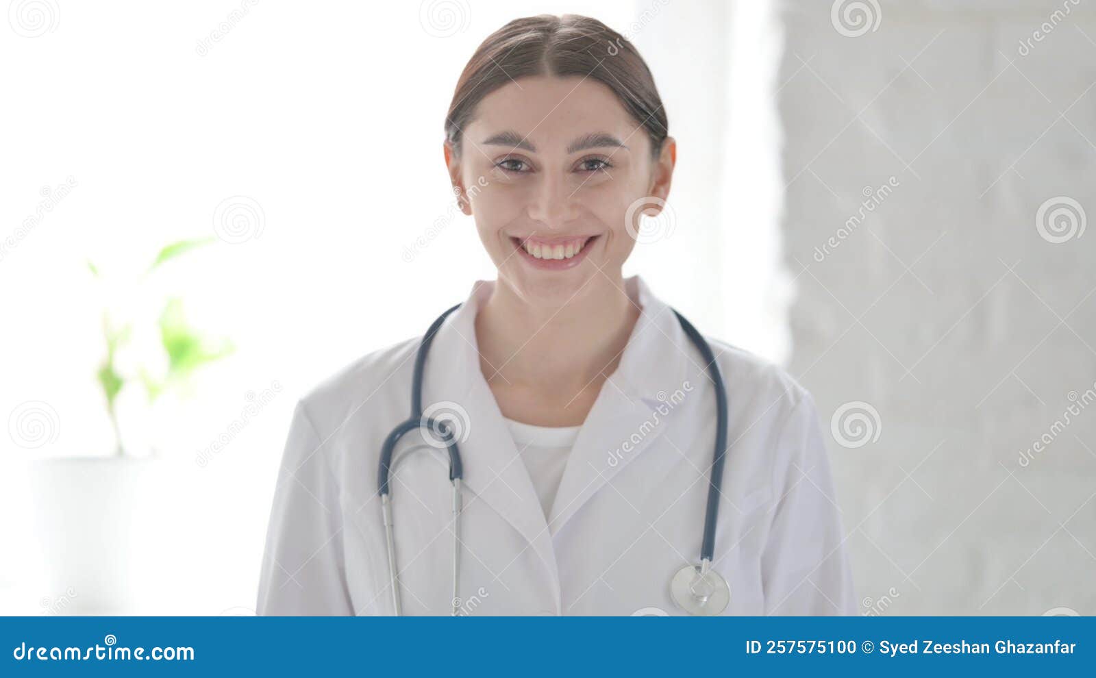 Portrait of Female Doctor Smiling at the Camera Stock Photo - Image of ...