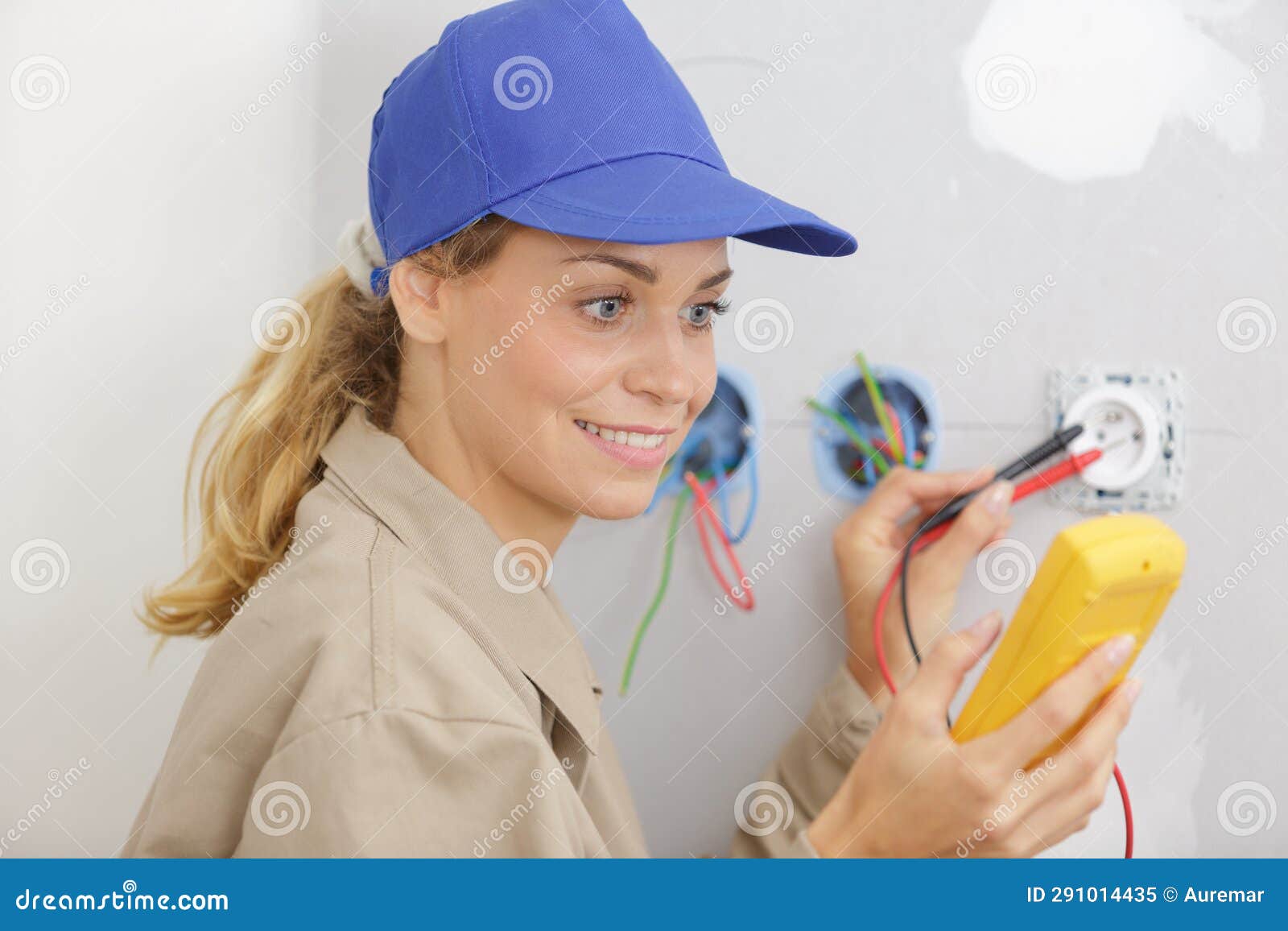 Portrait Female Electrician Using Multimeter Stock Image - Image of ...