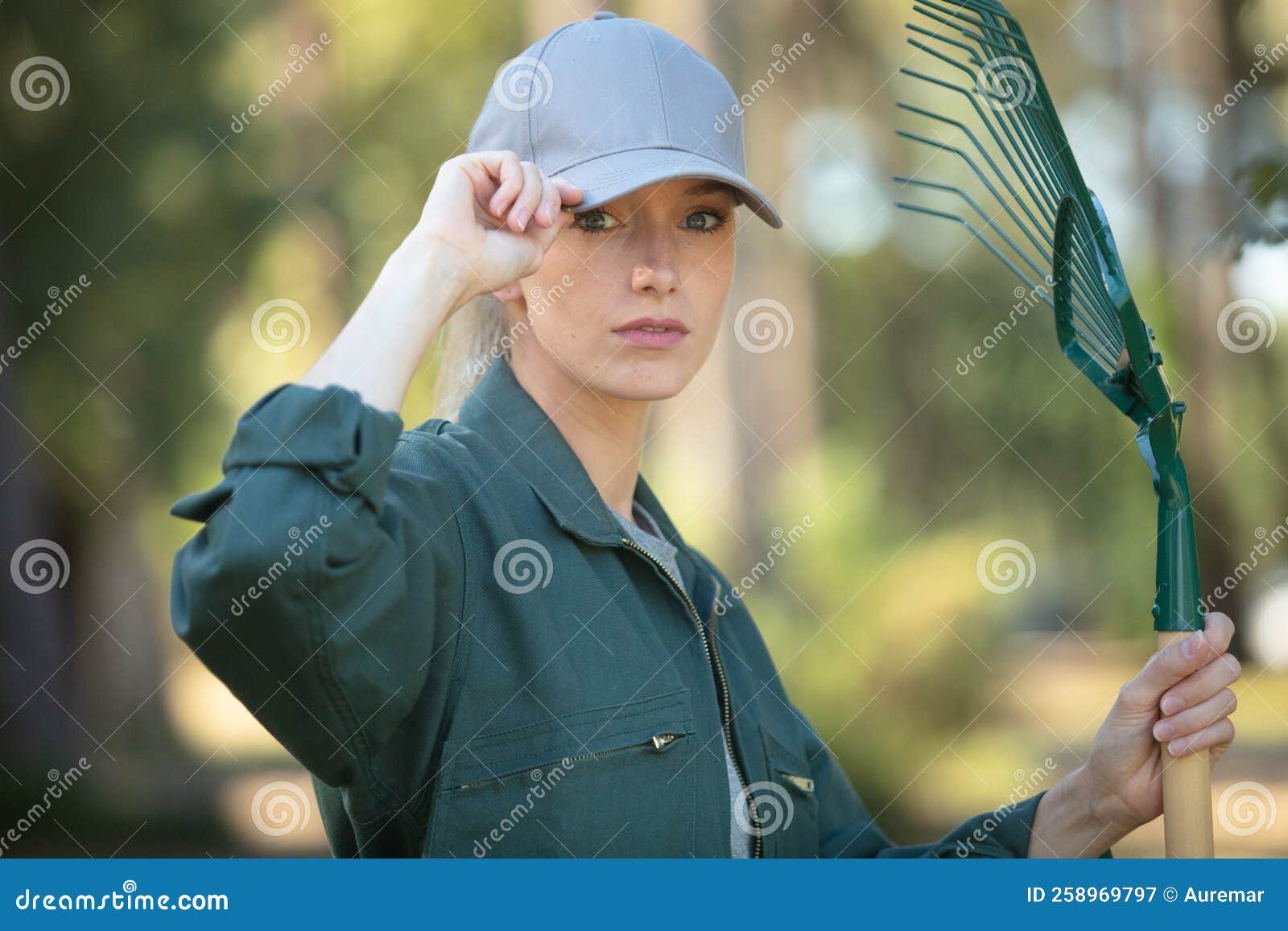 Portrait Female Gardener with Rake Stock Image - Image of tippingcap ...