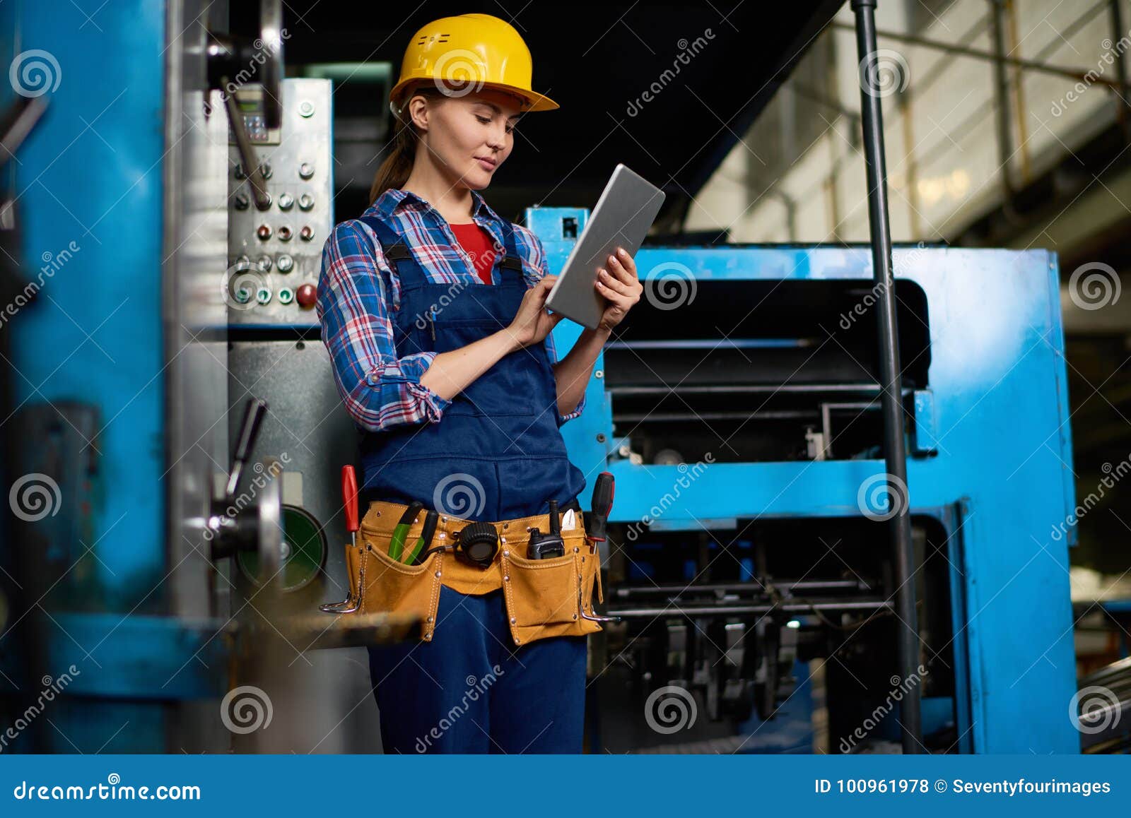 Female Technician Working at Factory Stock Photo - Image of industry ...