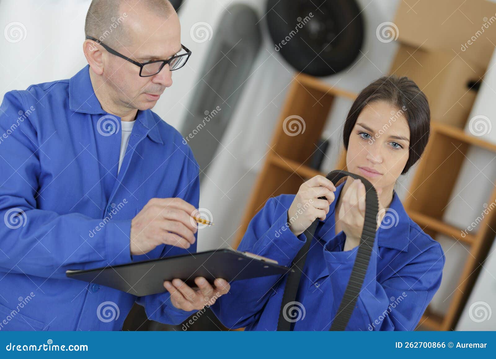 Portrait Female Mechanic Training Stock Photo - Image of board, shop ...