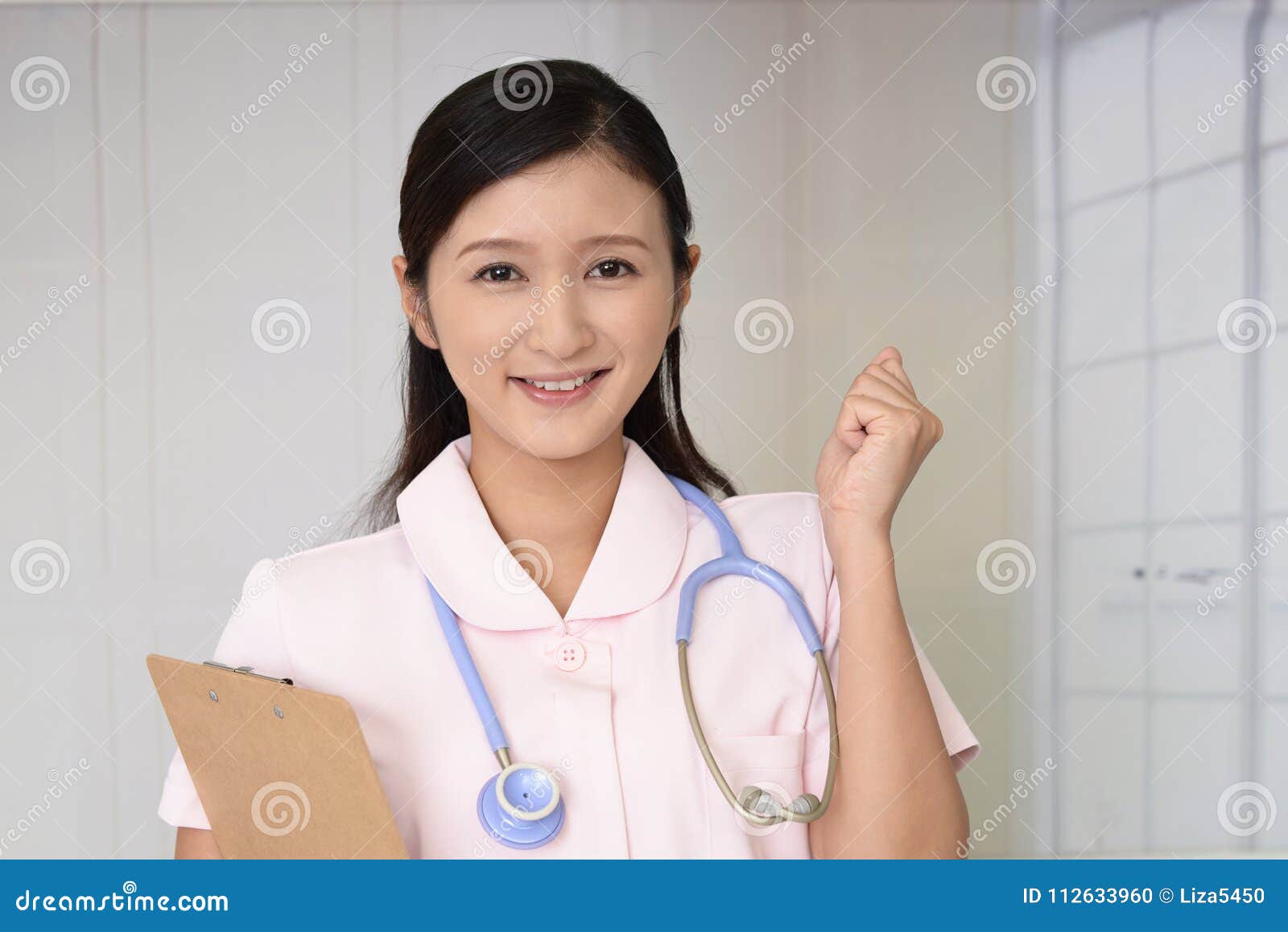 Smiling female nurse stock photo. Image of attractive - 112633960