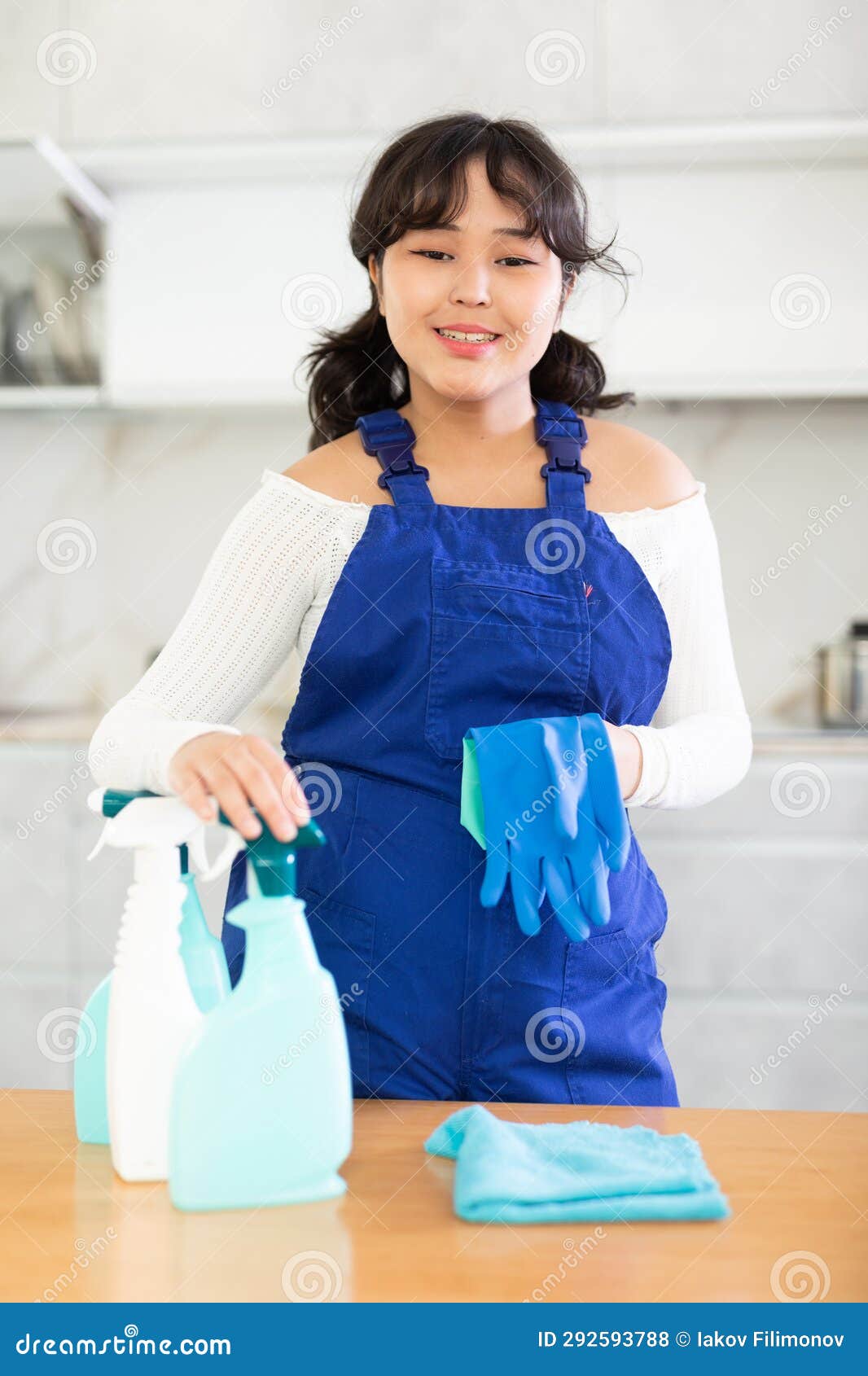 Portrait of a Female Professional Cleaner in Overalls in Kitchen Stock ...