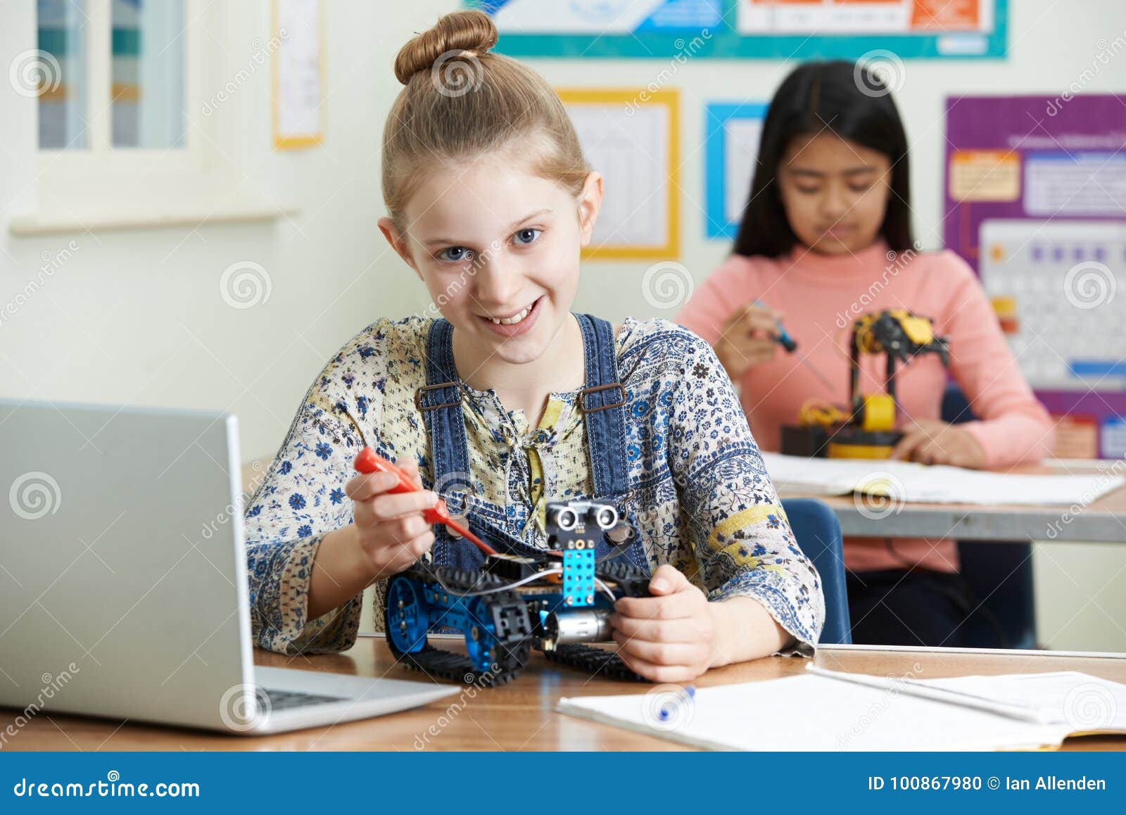 Portrait of Female Pupil in Science Lesson Studying Robotics Stock ... Portrait of Female Pupil in Science Lesson Studying Robotics Stock ...