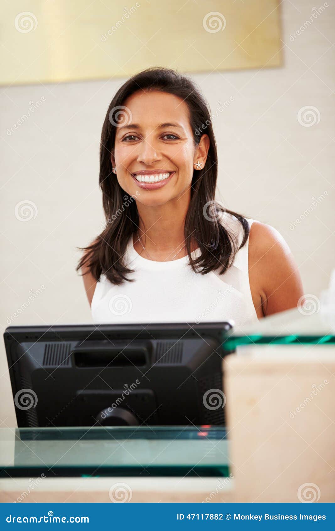 Portrait of Female Receptionist at Hotel Front Desk Stock Photo - Image ...