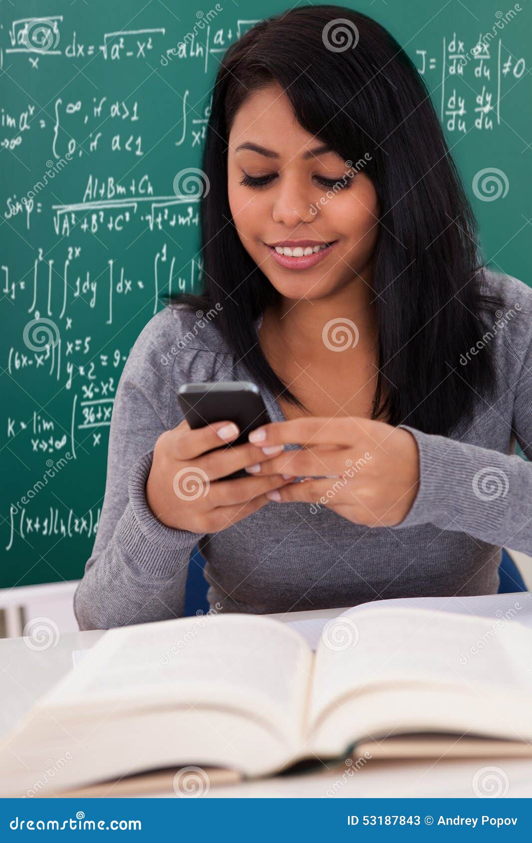 Portrait of Female Student Using Cell Phone Stock Image - Image of ...