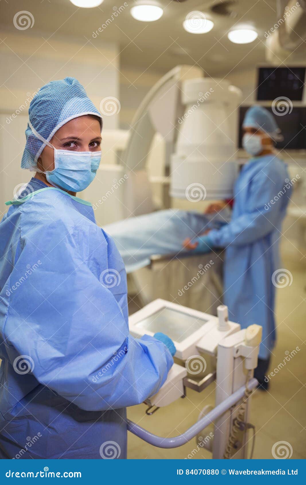 Portrait of Female Surgeon Using Machine in Operation Theater Stock ...