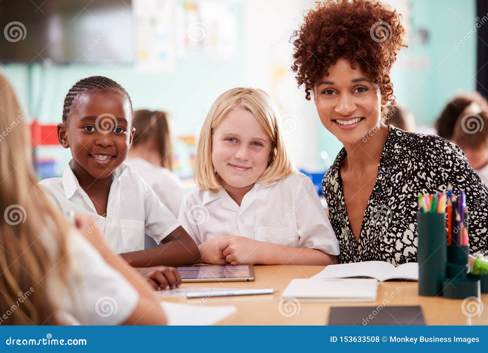 Portrait of Female Teacher with Elementary School Pupils Wearing ... Portrait of Female Teacher with Elementary School Pupils Wearing ...