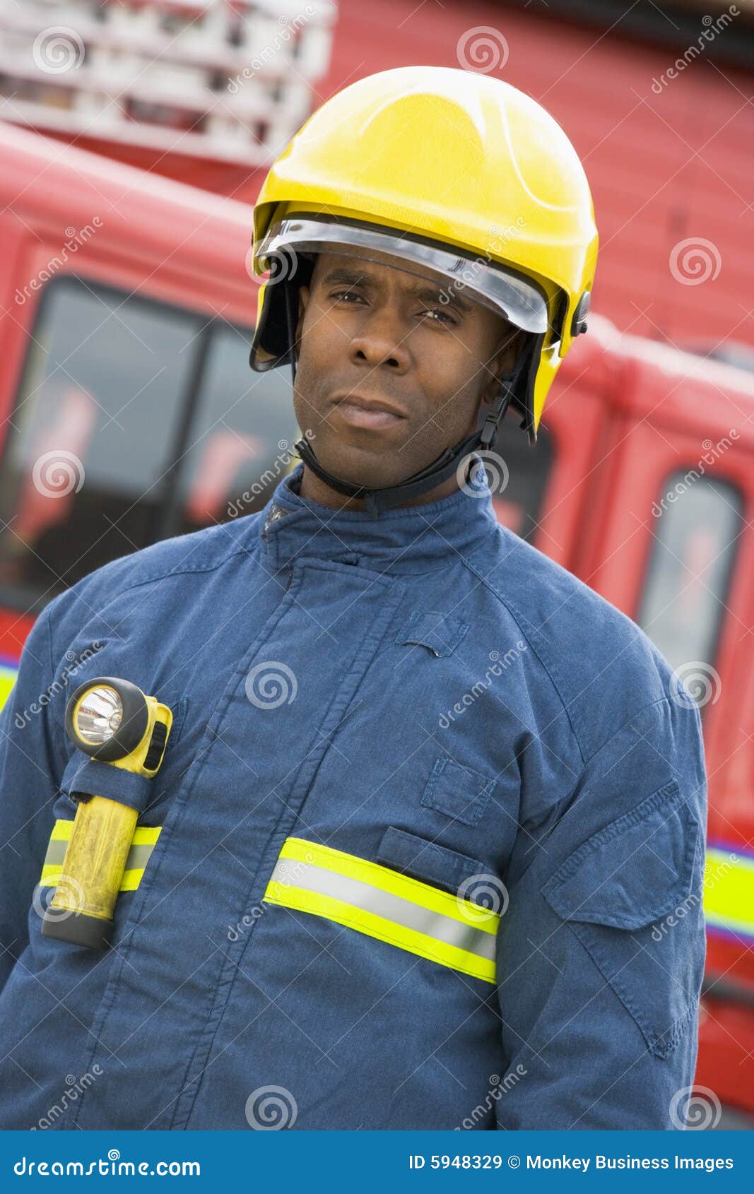 Portrait of a firefighter stock image. Image of middle - 5948329
