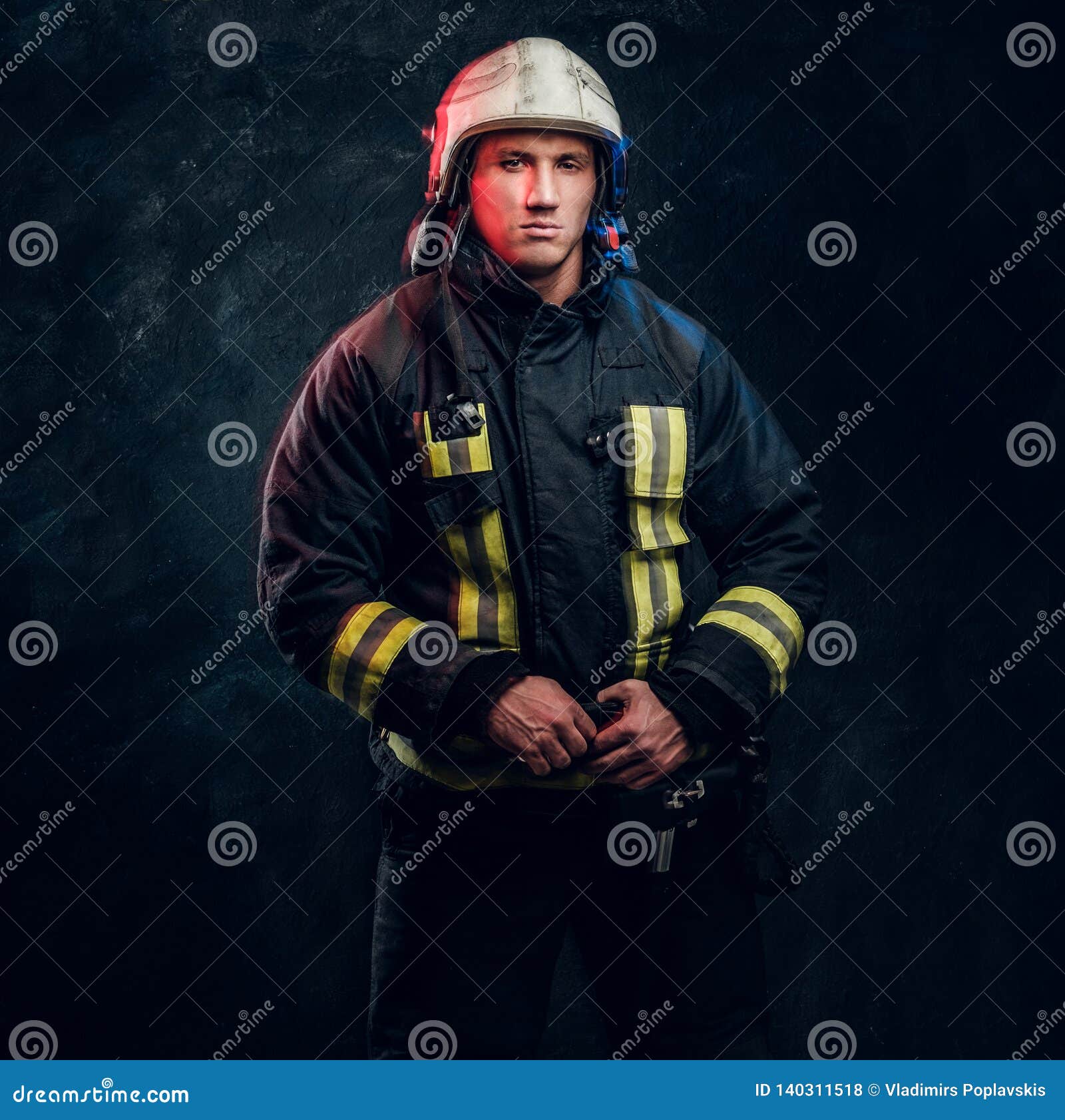 Portrait of Firefighter Dressed in Uniform and Safety Helmet Looking ...