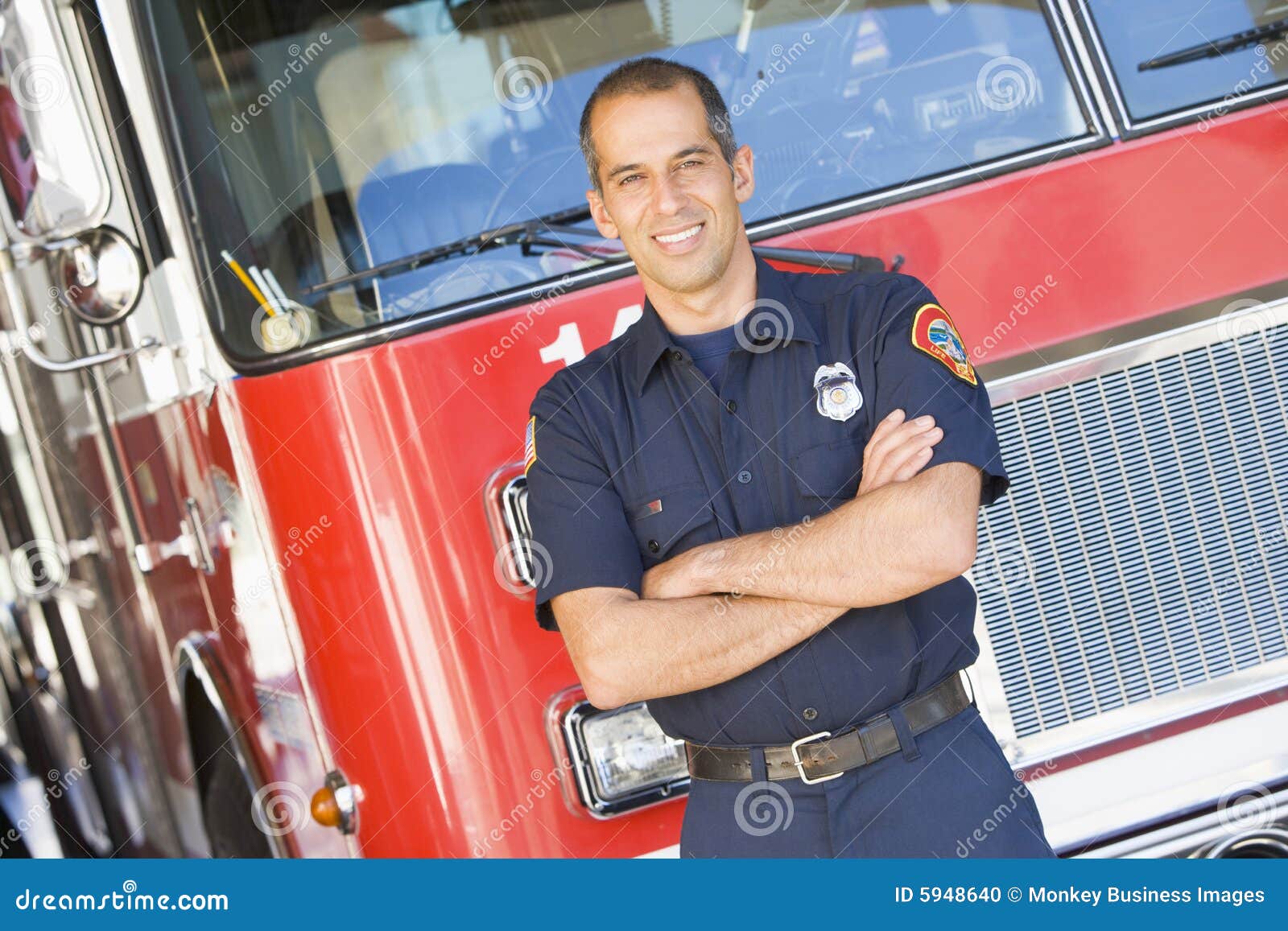 Portrait of a Firefighter by a Fire Engine Stock Photo - Image of ...