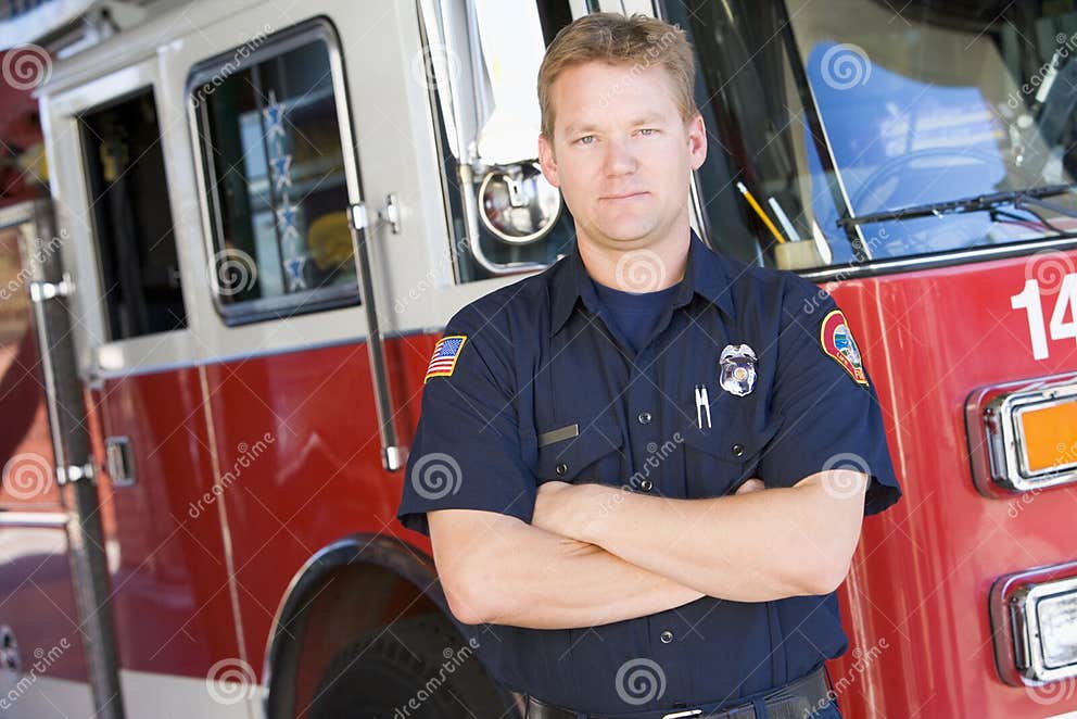 Portrait of a Firefighter by a Fire Engine Stock Photo - Image of model ...