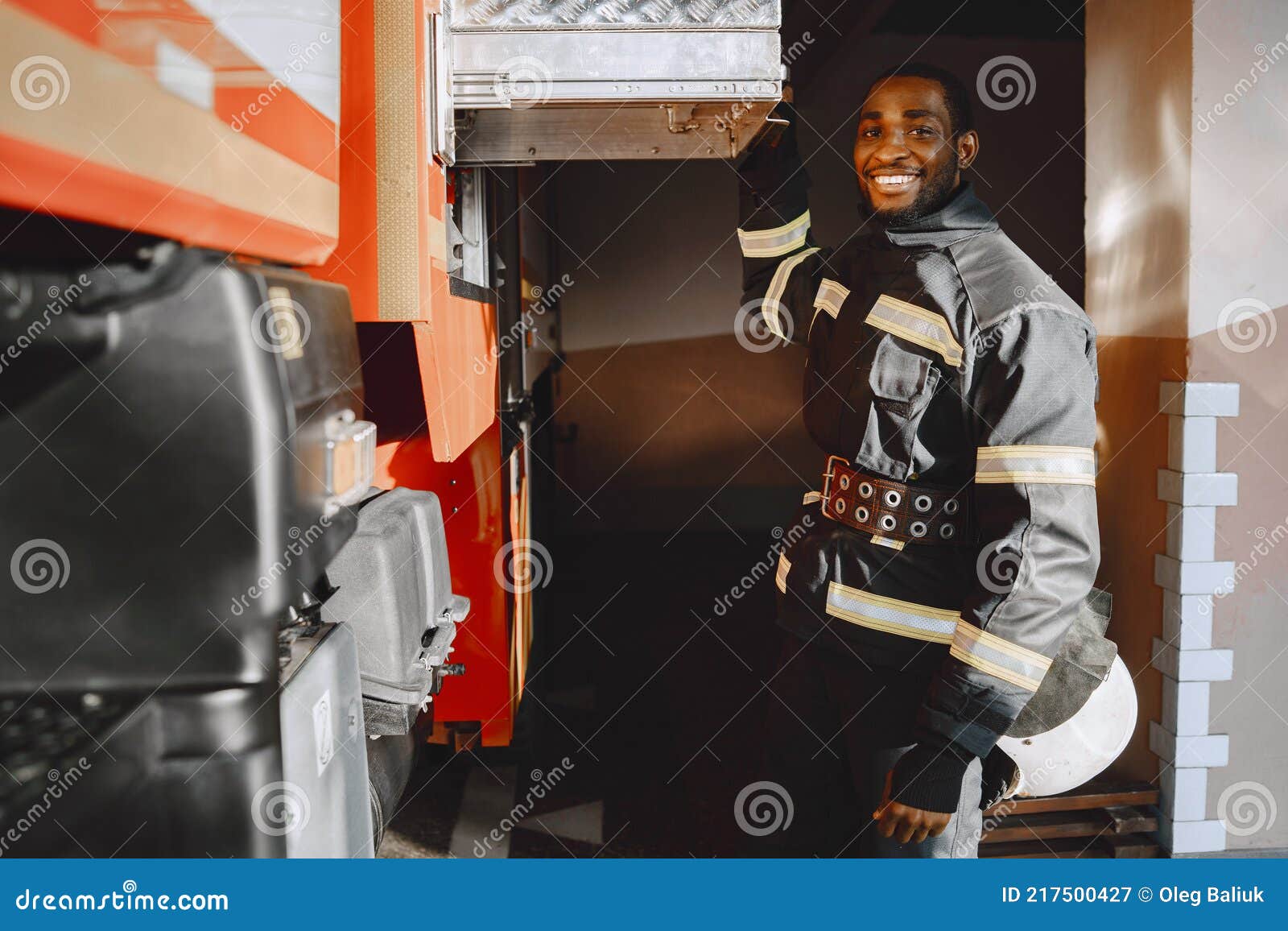 Portrait of a Firefighter Standing in Front of a Fire Engine Stock ...