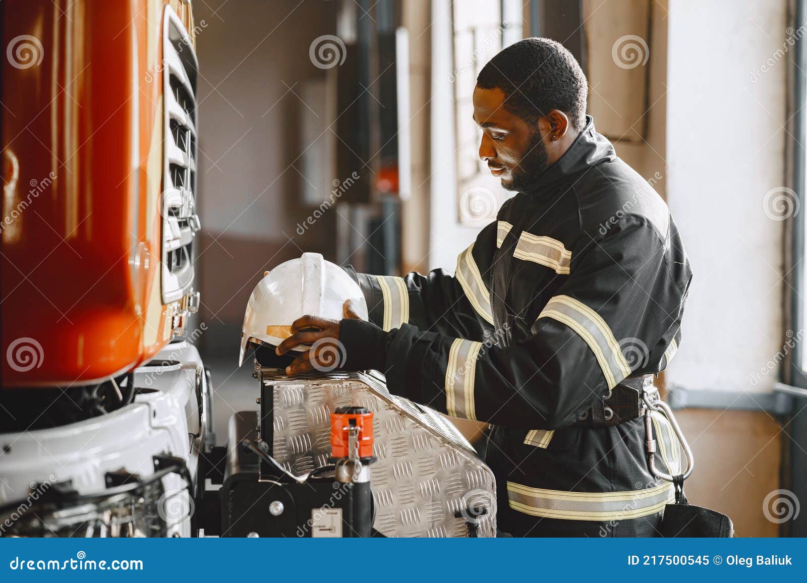 Portrait of a Firefighter Standing in Front of a Fire Engine Stock ...