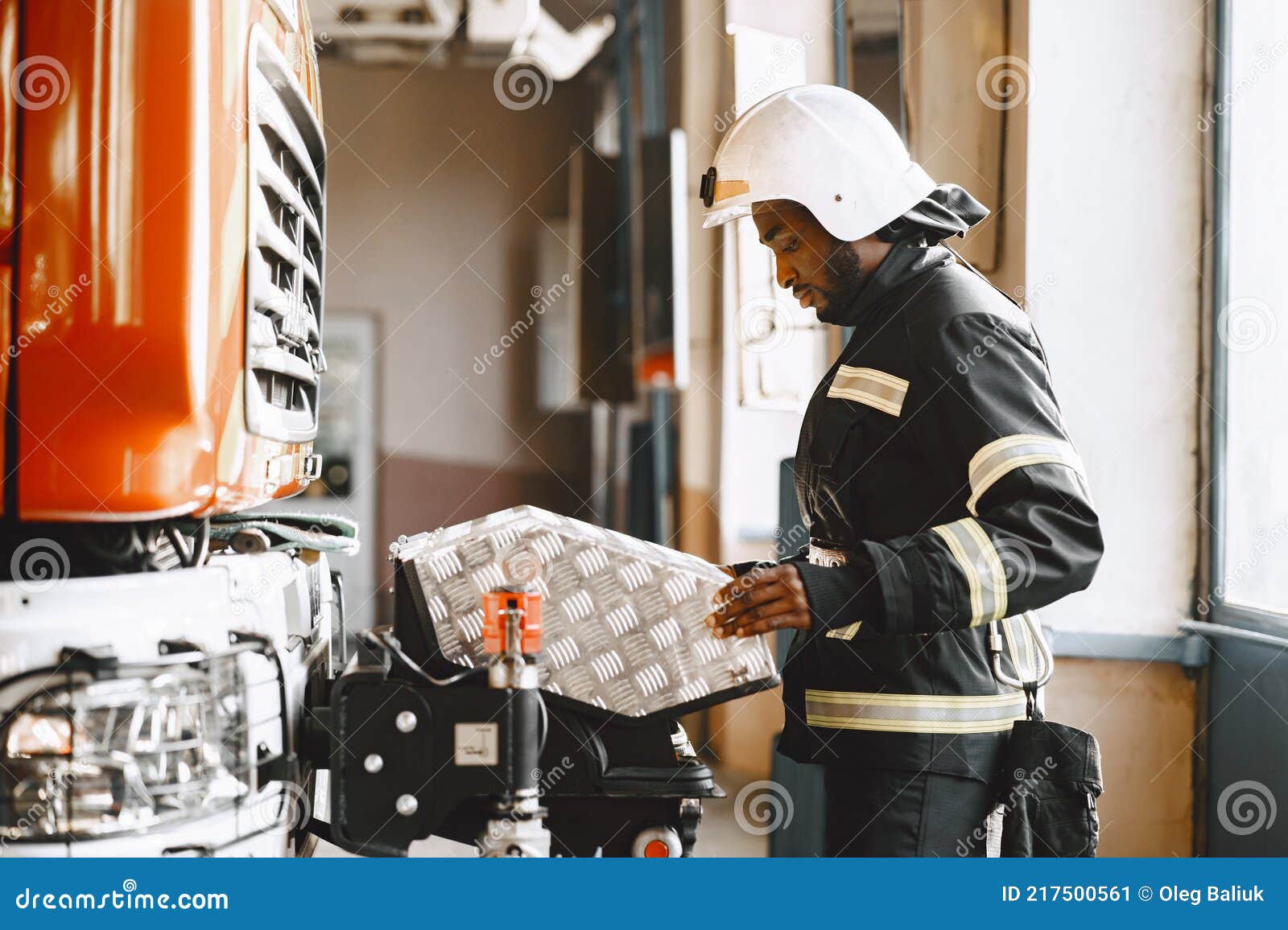 Portrait of a Firefighter Standing in Front of a Fire Engine Stock ...