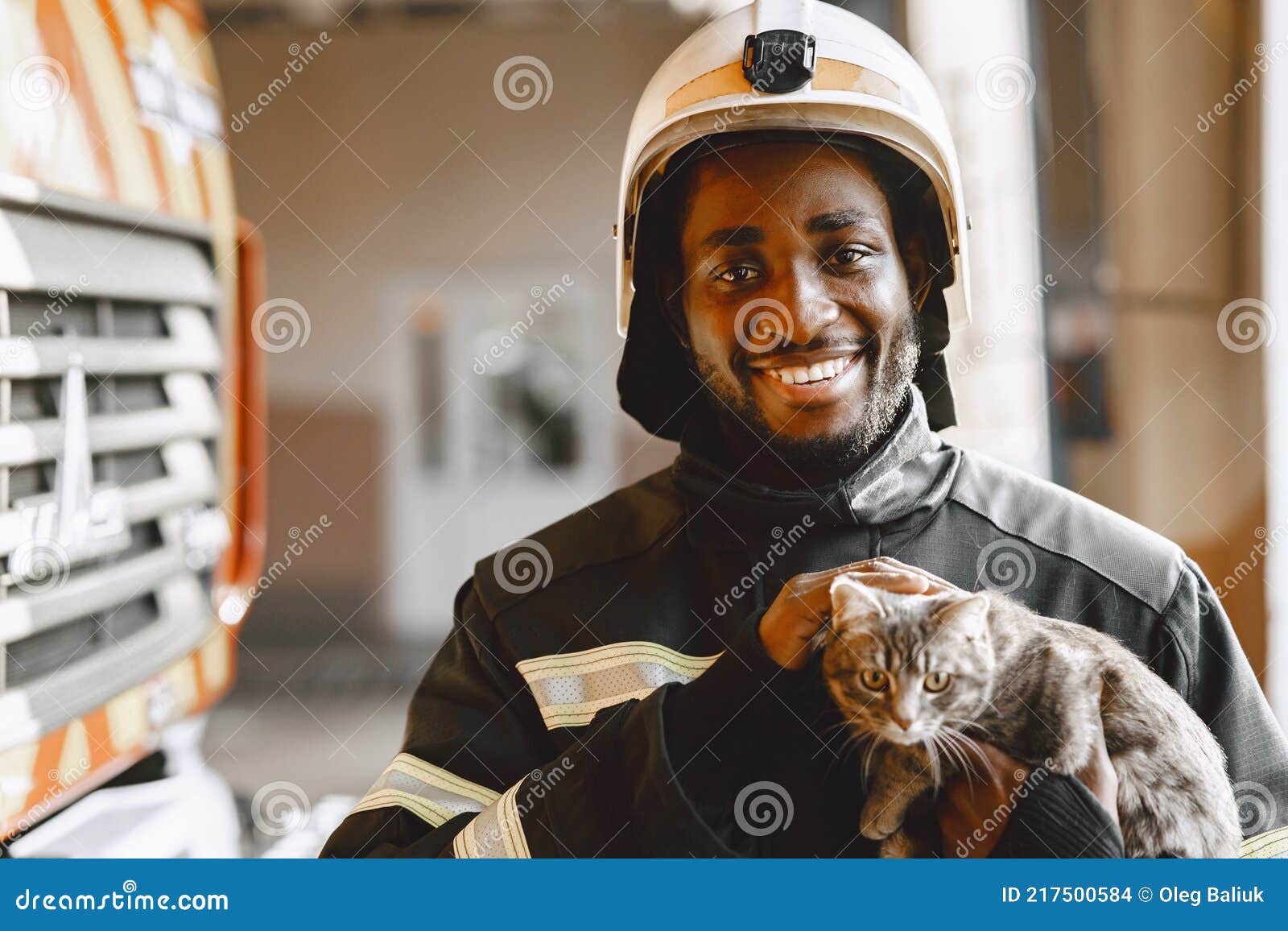 Portrait of a Firefighter Standing in Front of a Fire Engine Stock ...