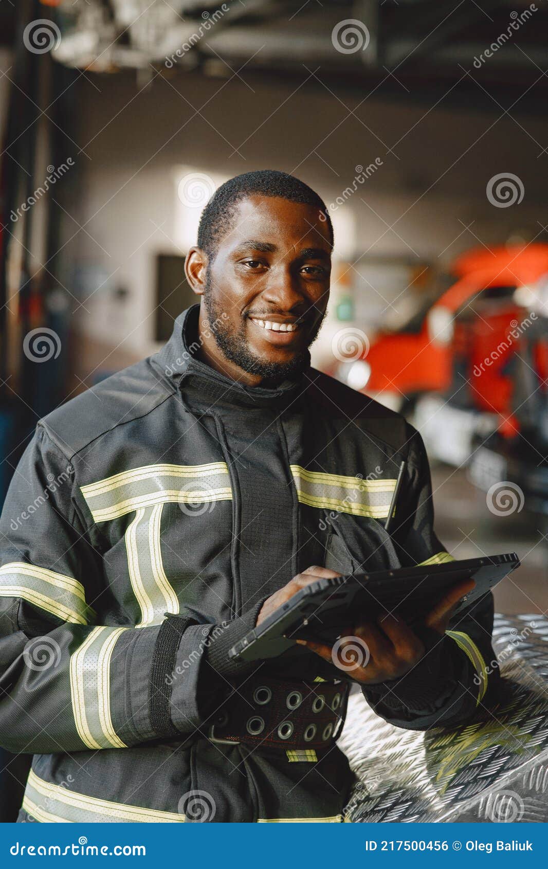 Portrait of a Firefighter Standing in Front of a Fire Engine Stock ...