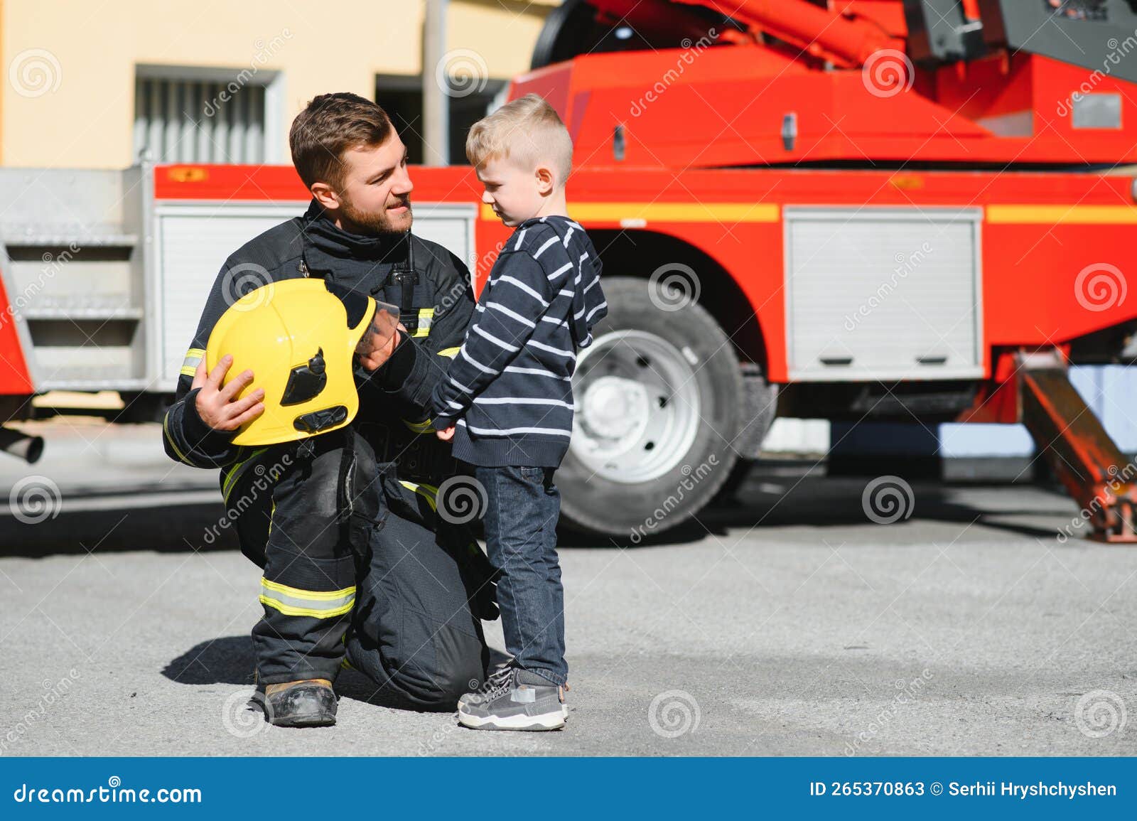 Portrait of a Firefighter Standing in Front of a Fire Engine Stock ...