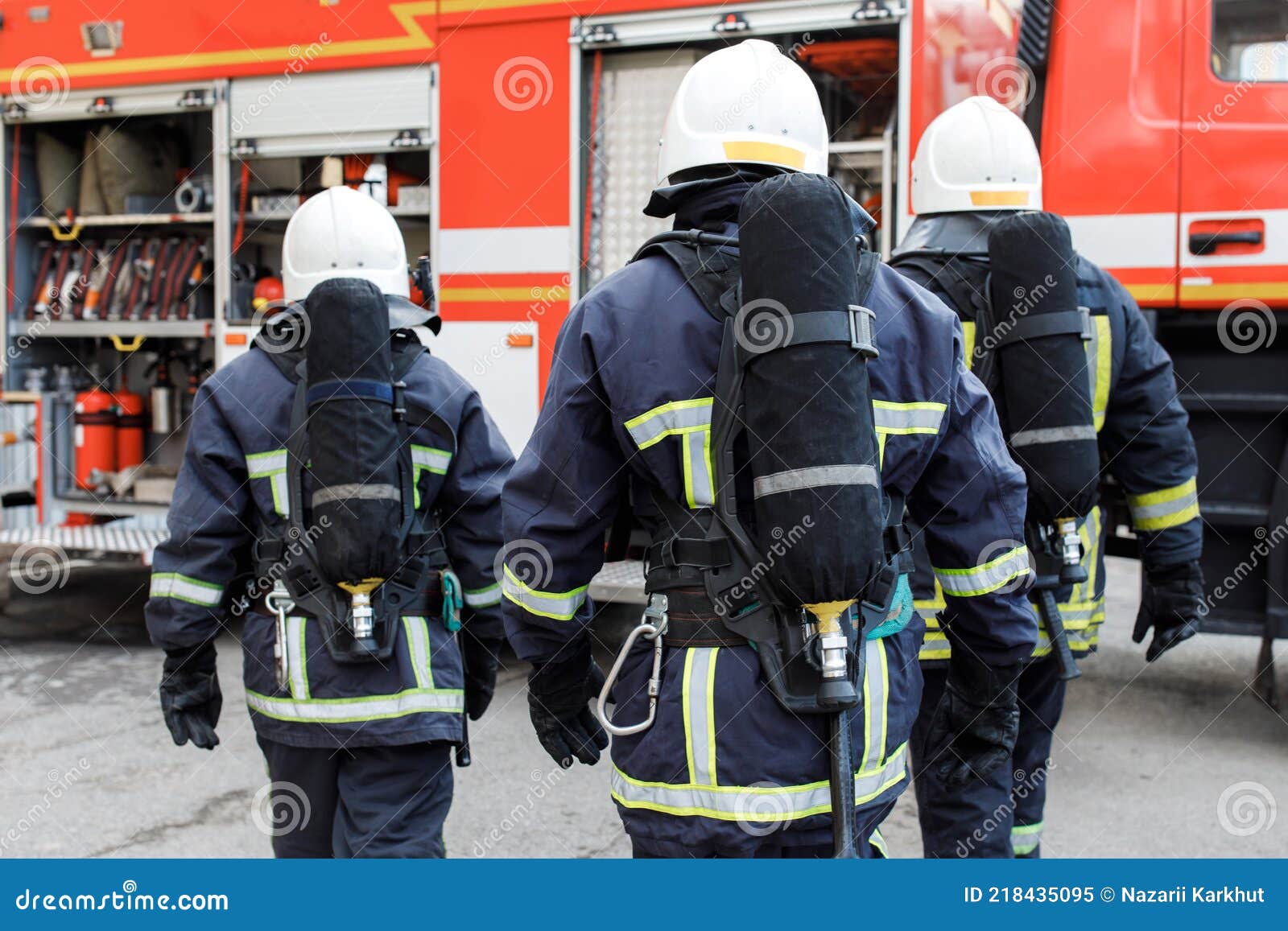 Portrait of Firefighter in Uniform in Front of Fire Engine Machine and ...