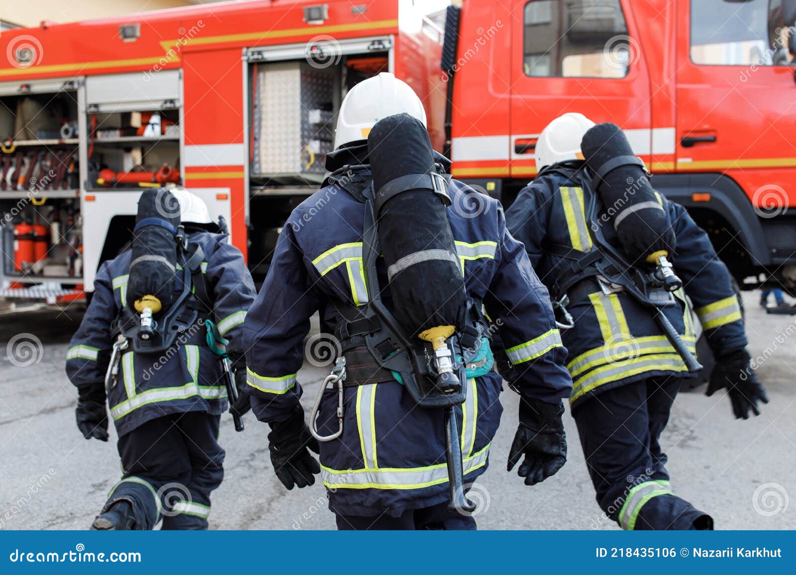 Portrait of Firefighter in Uniform in Front of Fire Engine Machine and ...