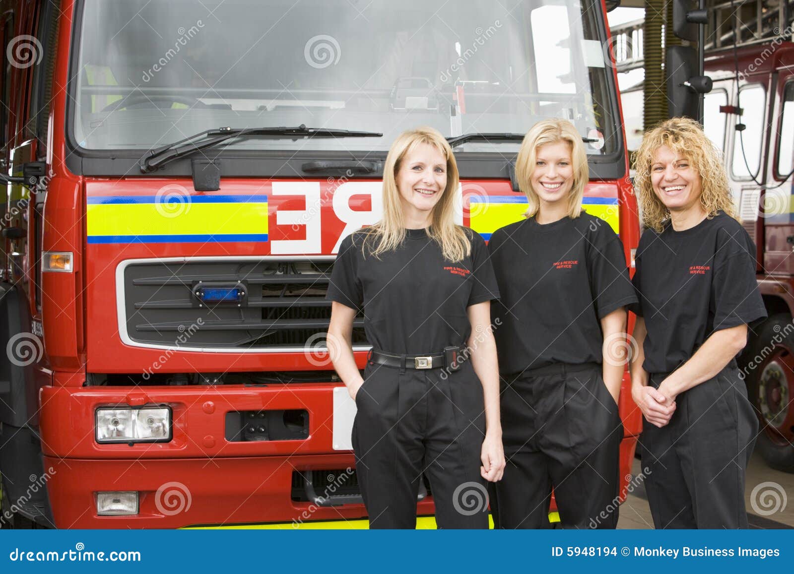 Portrait of Firefighters Standing by a Fire Engine Stock Photo - Image ...
