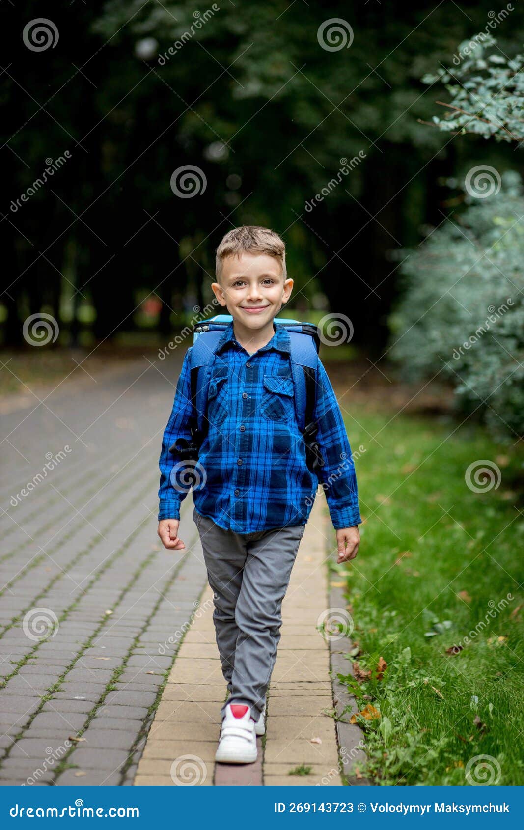 Portrait of a First Grader with a Backpack. the Boy Goes To School ...
