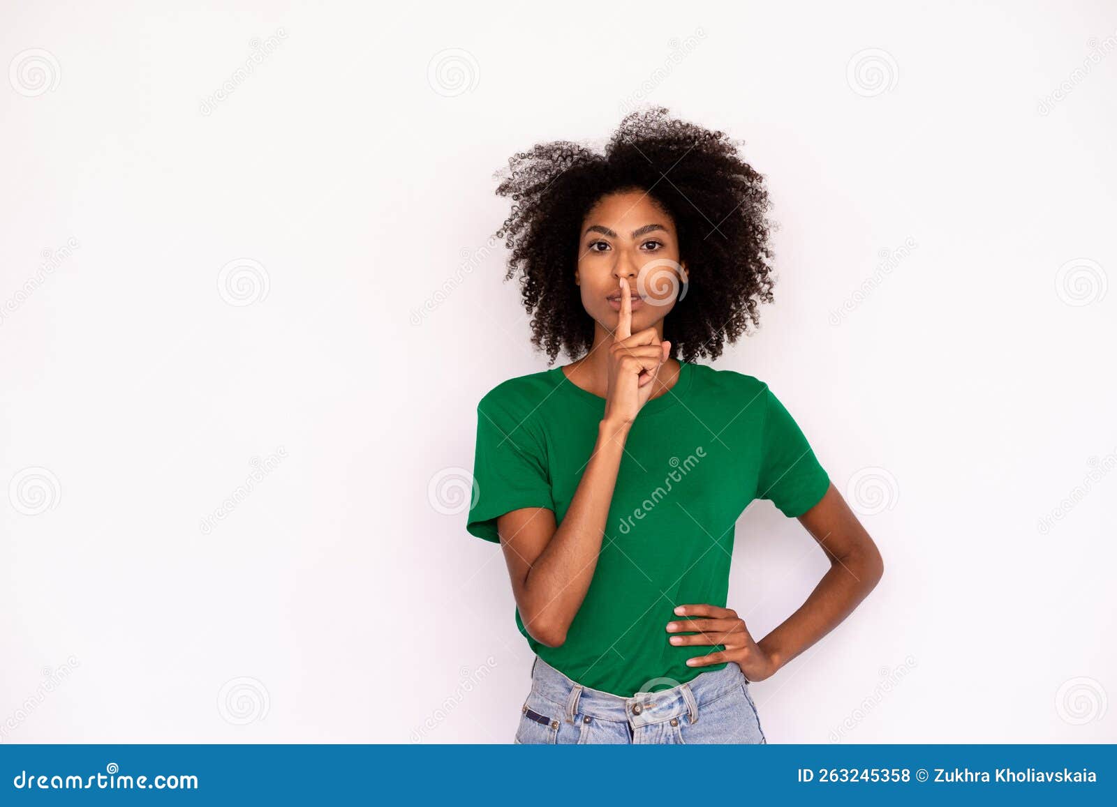 Portrait of Flirty Young Woman Making Silence Gesture Stock Photo ... Portrait of Flirty Young Woman Making Silence Gesture Stock Photo ...