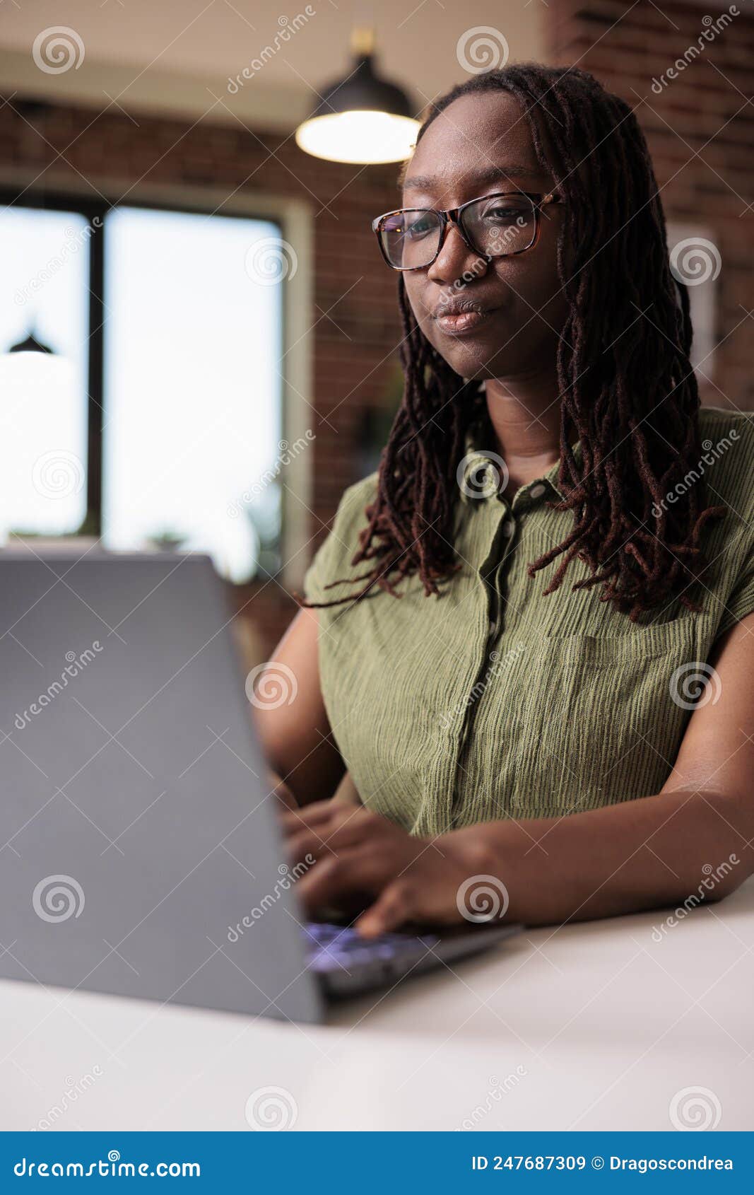 Portrait of Focused Student Doing Homework Typing on Laptop Keyboard ...