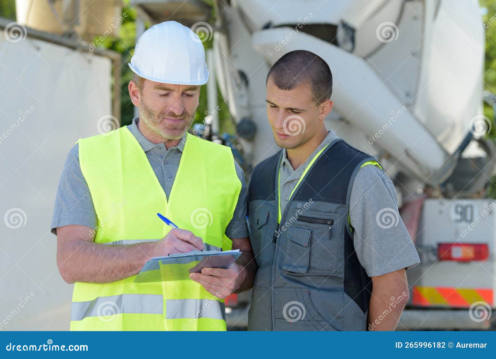 Portrait Foreman and Supervisor Discussing Construction Site Stock ...