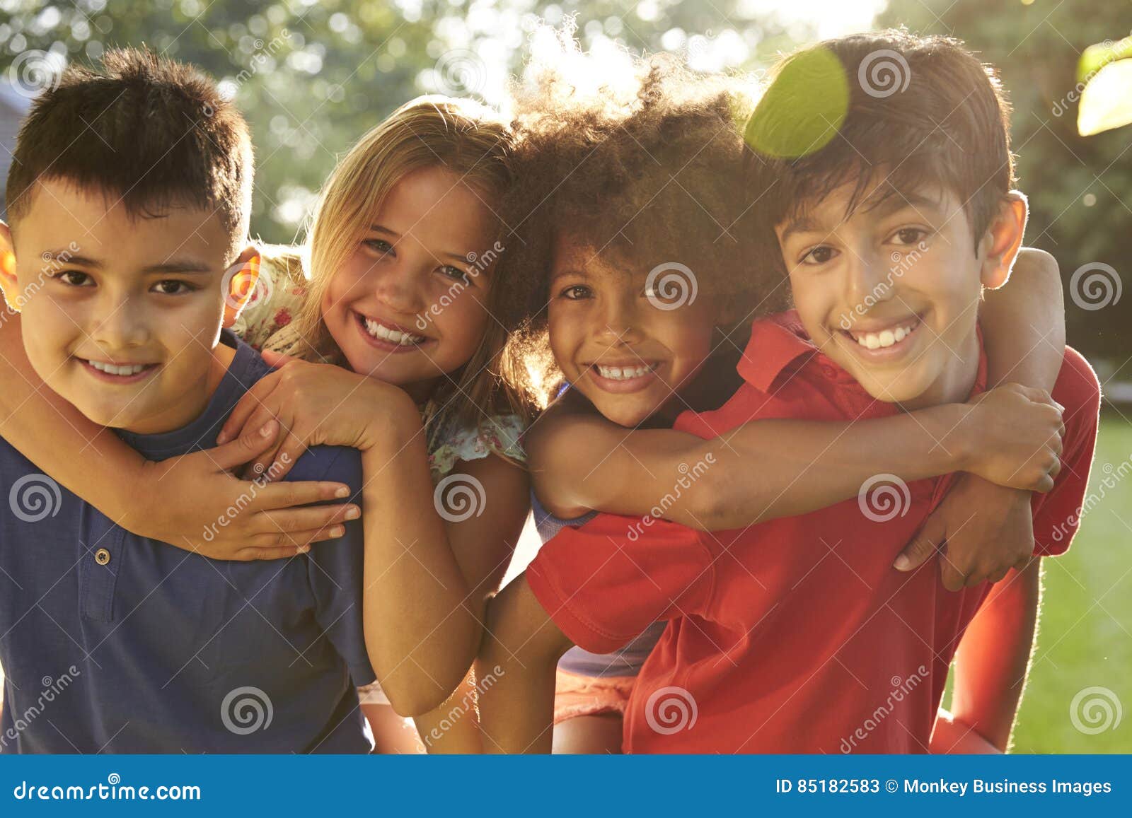 Portrait of Four Children Having Fun Outdoors Together Stock Image ...
