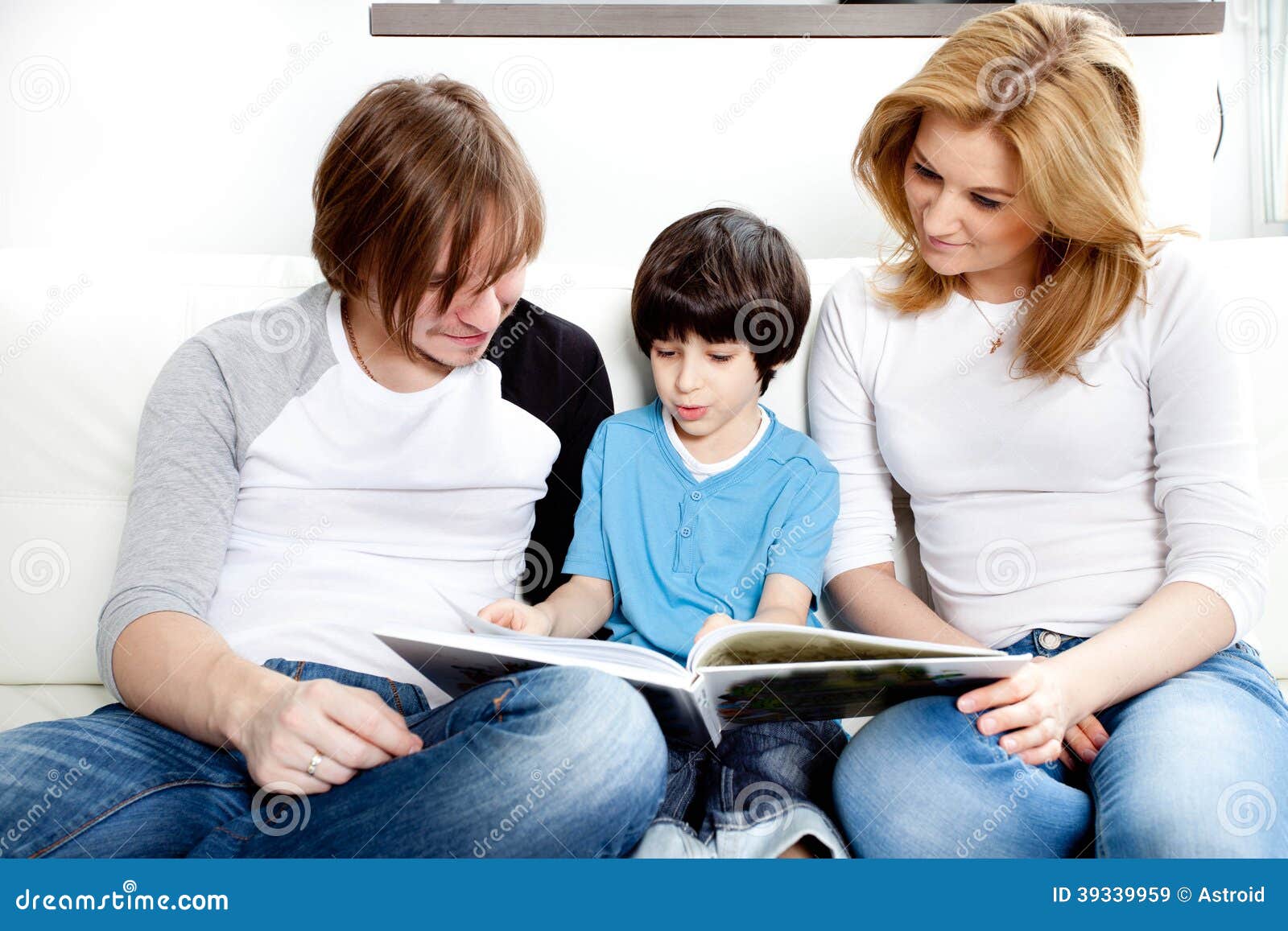 Portrait of Friendly Family Reading Book Stock Image - Image of ...