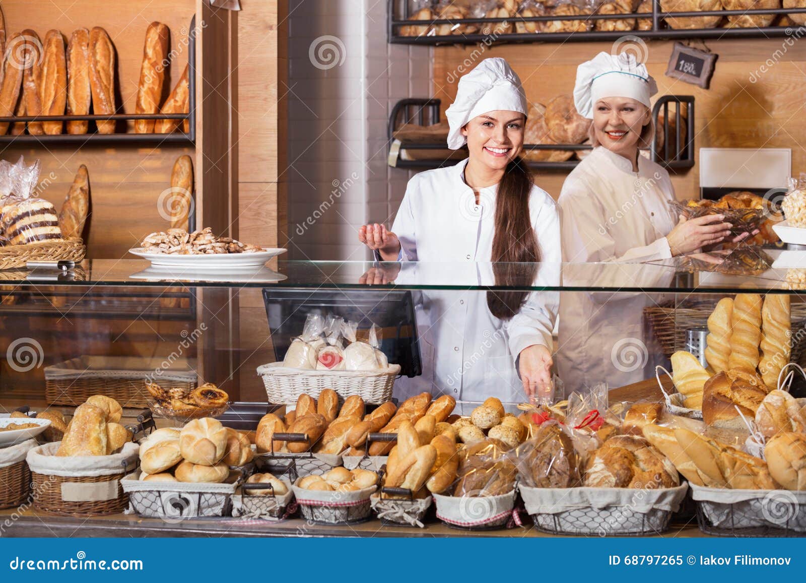 Portrait of Friendly Women at Bakery Display Stock Image - Image of ...