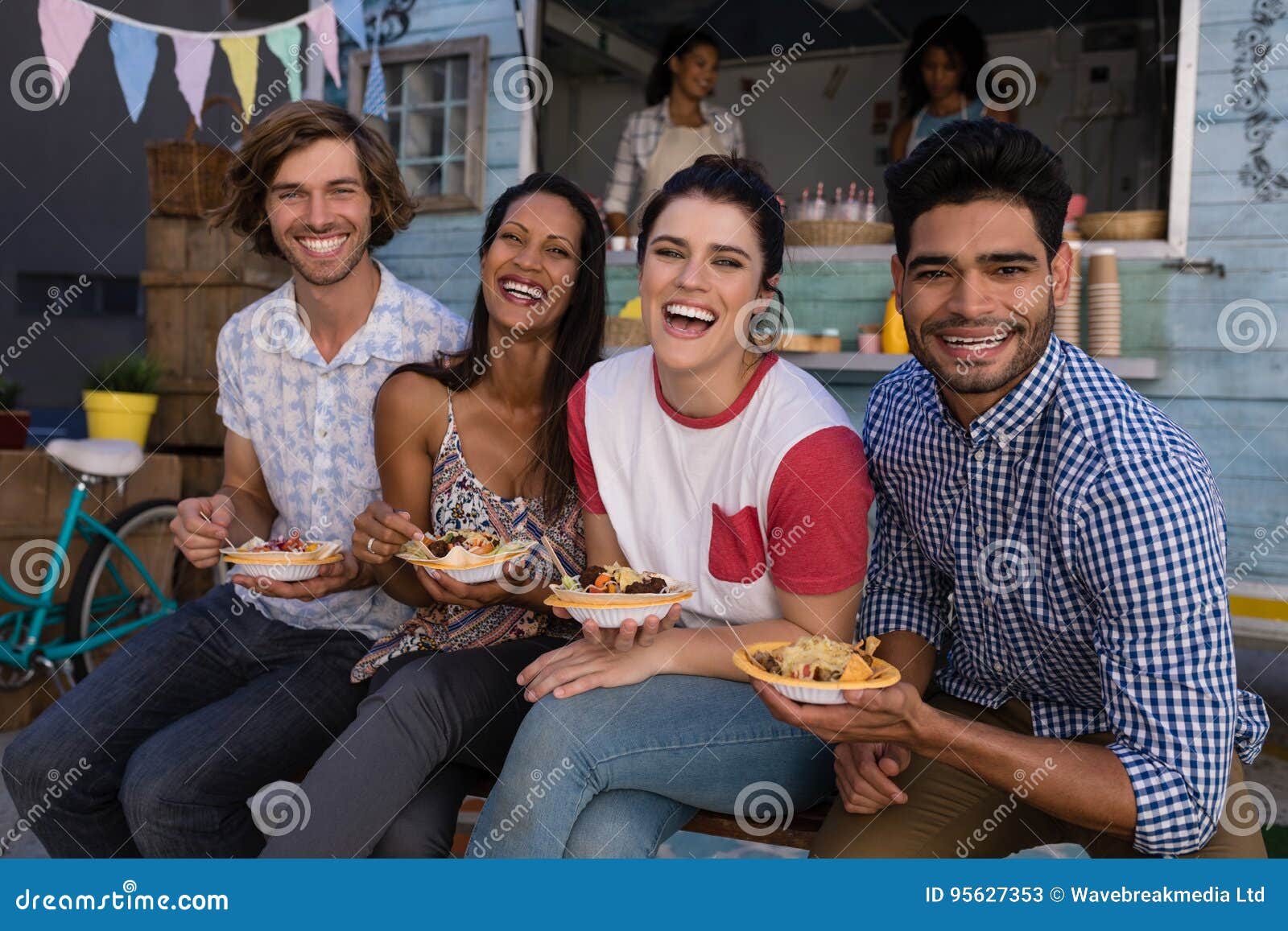 Portrait of Friends Sitting with Snacks Stock Image - Image of male ...