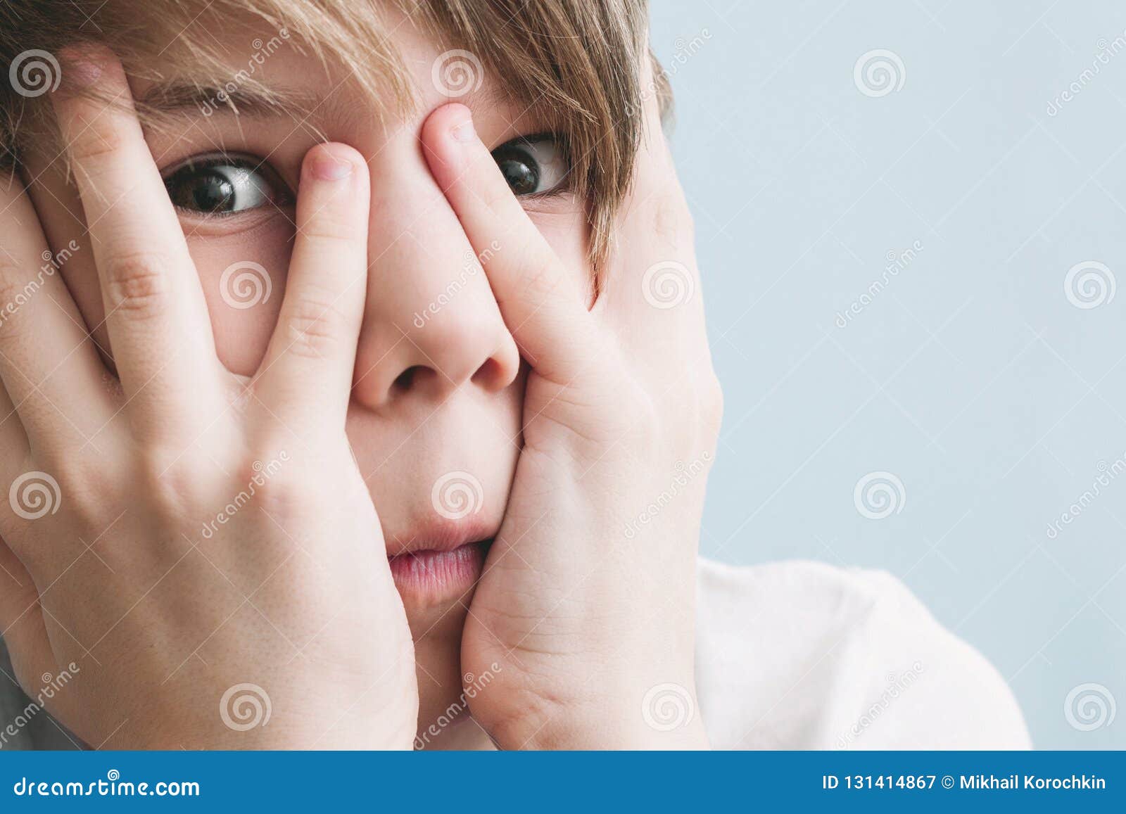 Portrait of frightened boy stock image. Image of negative - 131414867