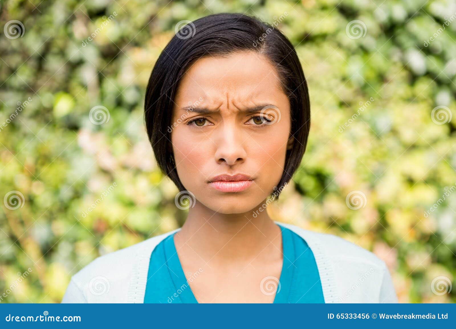 Portrait of Frowning Brunette Stock Photo - Image of outdoor, lifestyle ...