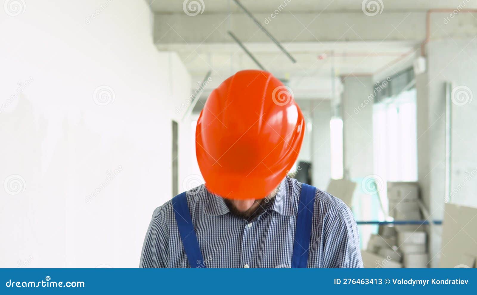 Portrait of Funny Builder on the Construction Site of Modern Office ...