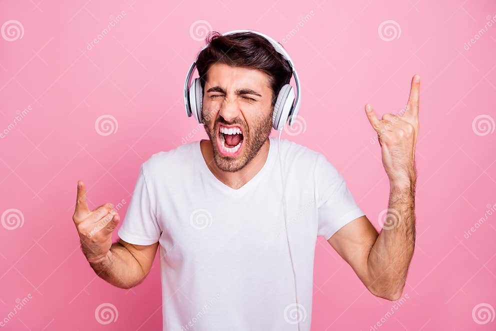 Portrait Of Funny Funky Brunet Hair Middle Eastern Rocker Man Show