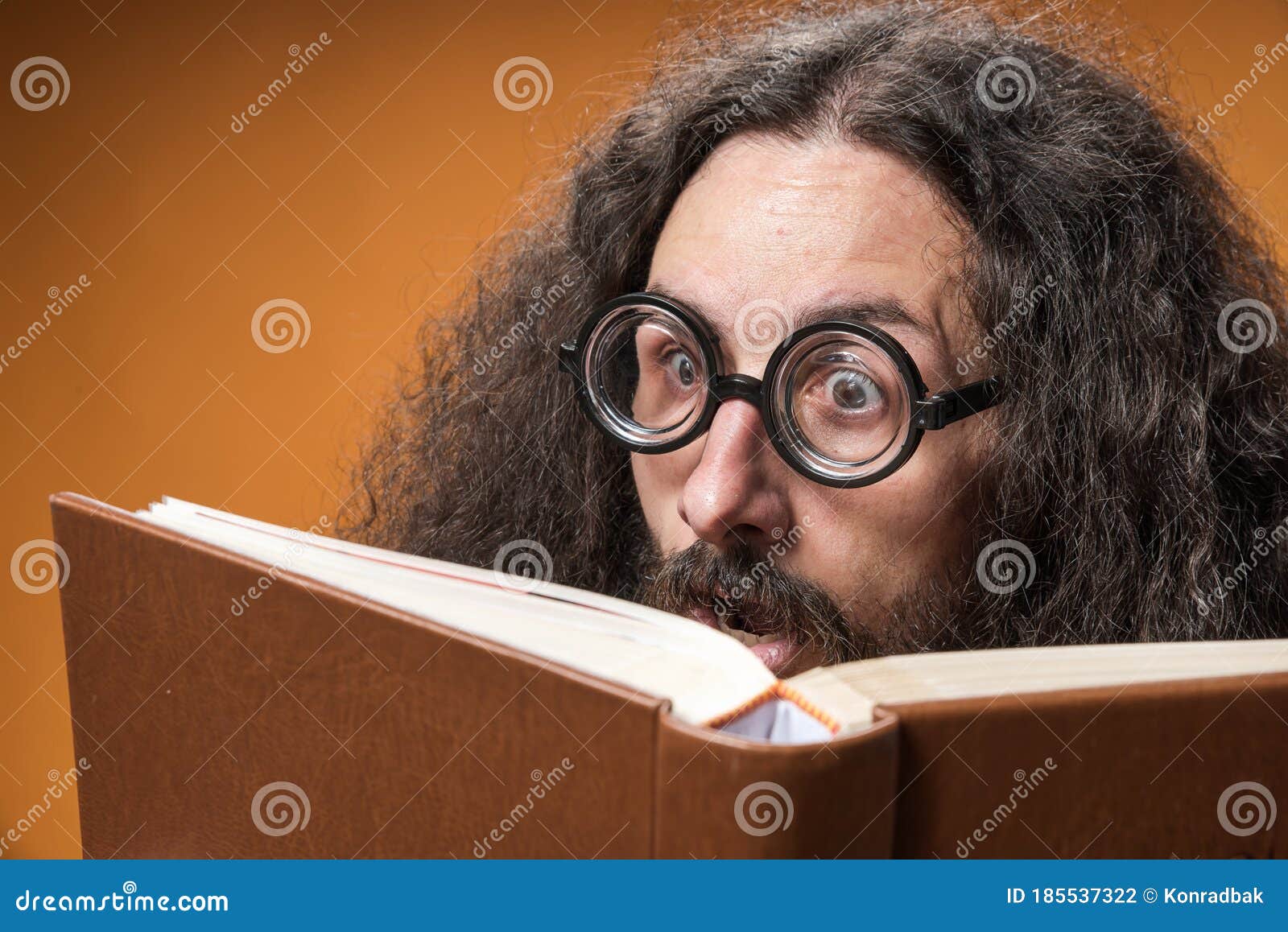 Portrait of a Funny Geek Reading a Book Stock Photo - Image of ...