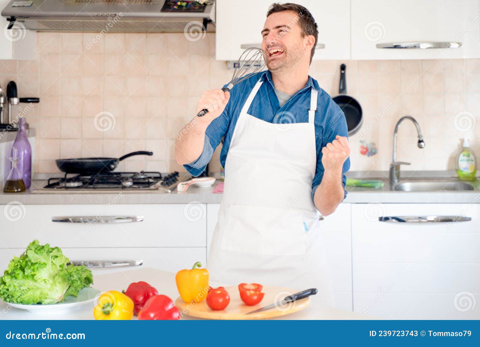 Portrait of Funny Man Cooking and Singing in the Kitchen Stock Image ...