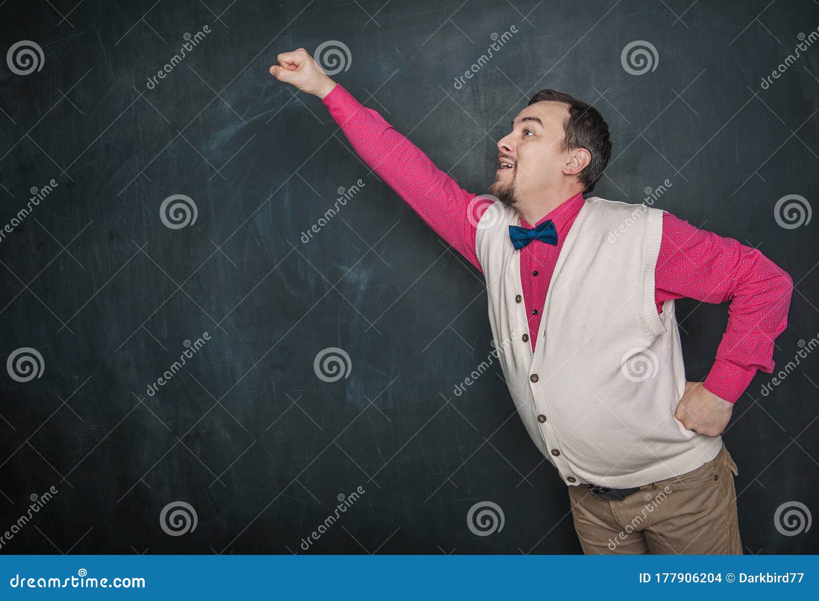 Portrait of Funny Nerd Man in Superhero Pose on Blackboard Stock Photo ...