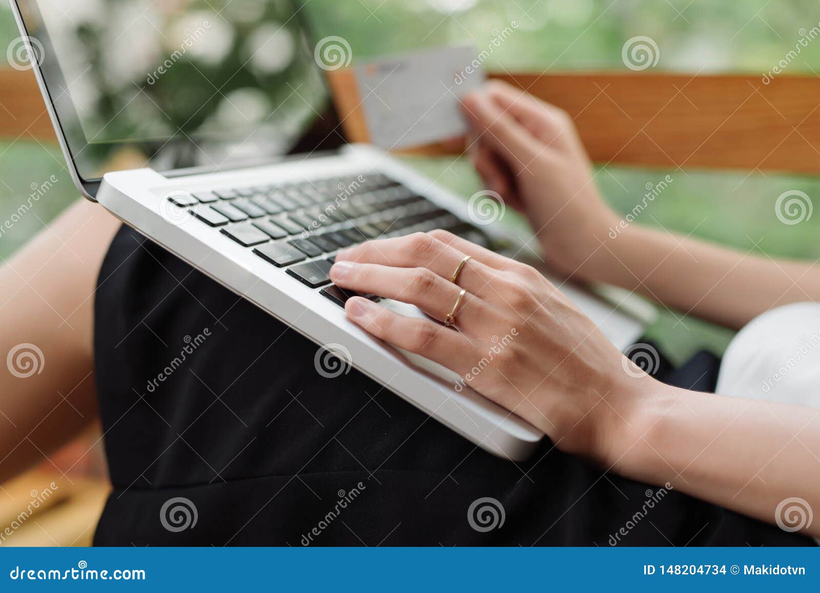 Portrait of a Girl Holding Credit Card and Using Laptop. Online ... Portrait of a Girl Holding Credit Card and Using Laptop. Online ...