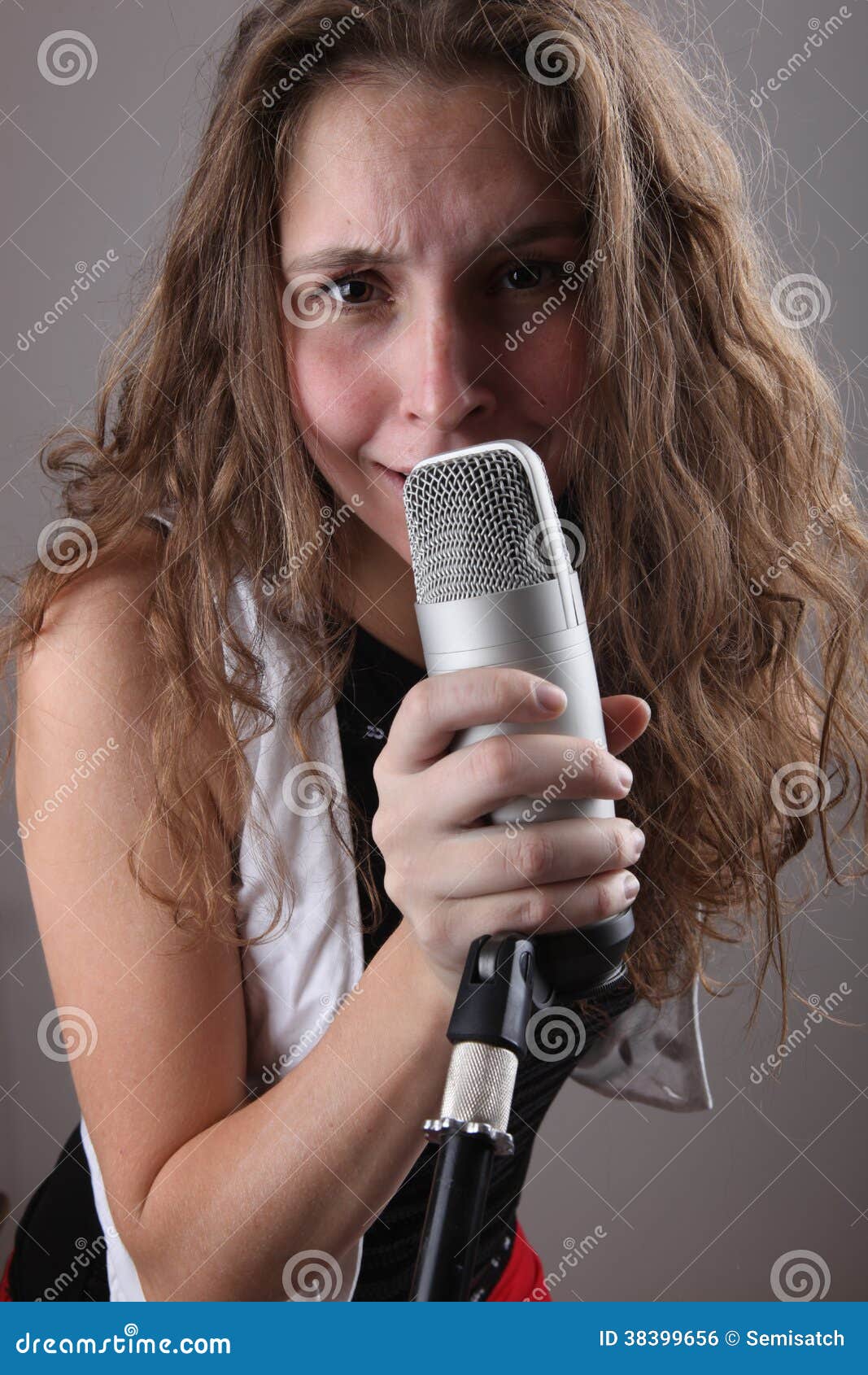 Portrait of a Girl with a Microphone Stock Photo - Image of performing ...